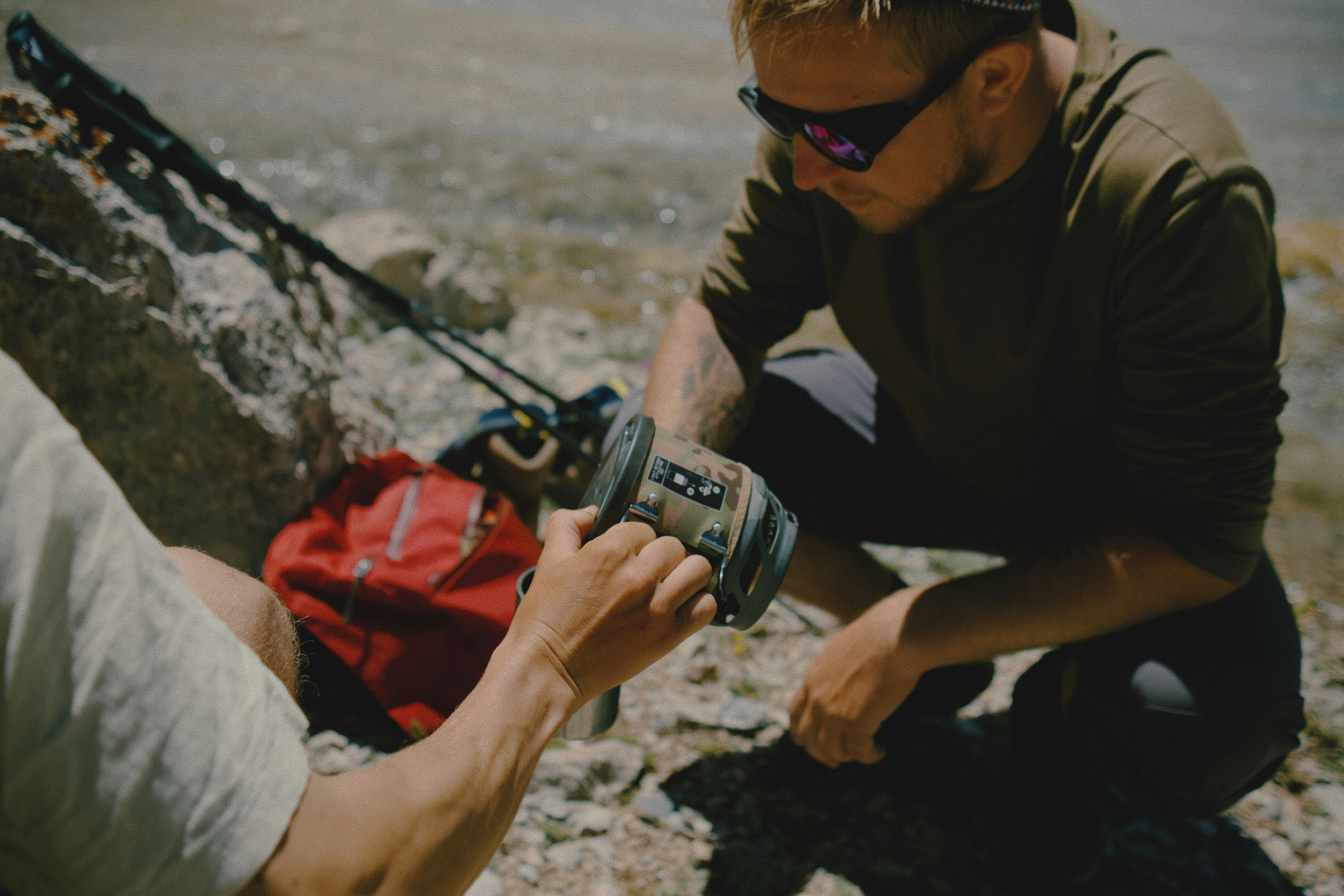 Handshake on the Riverbank: A Rescue Gear Exchange in the Field