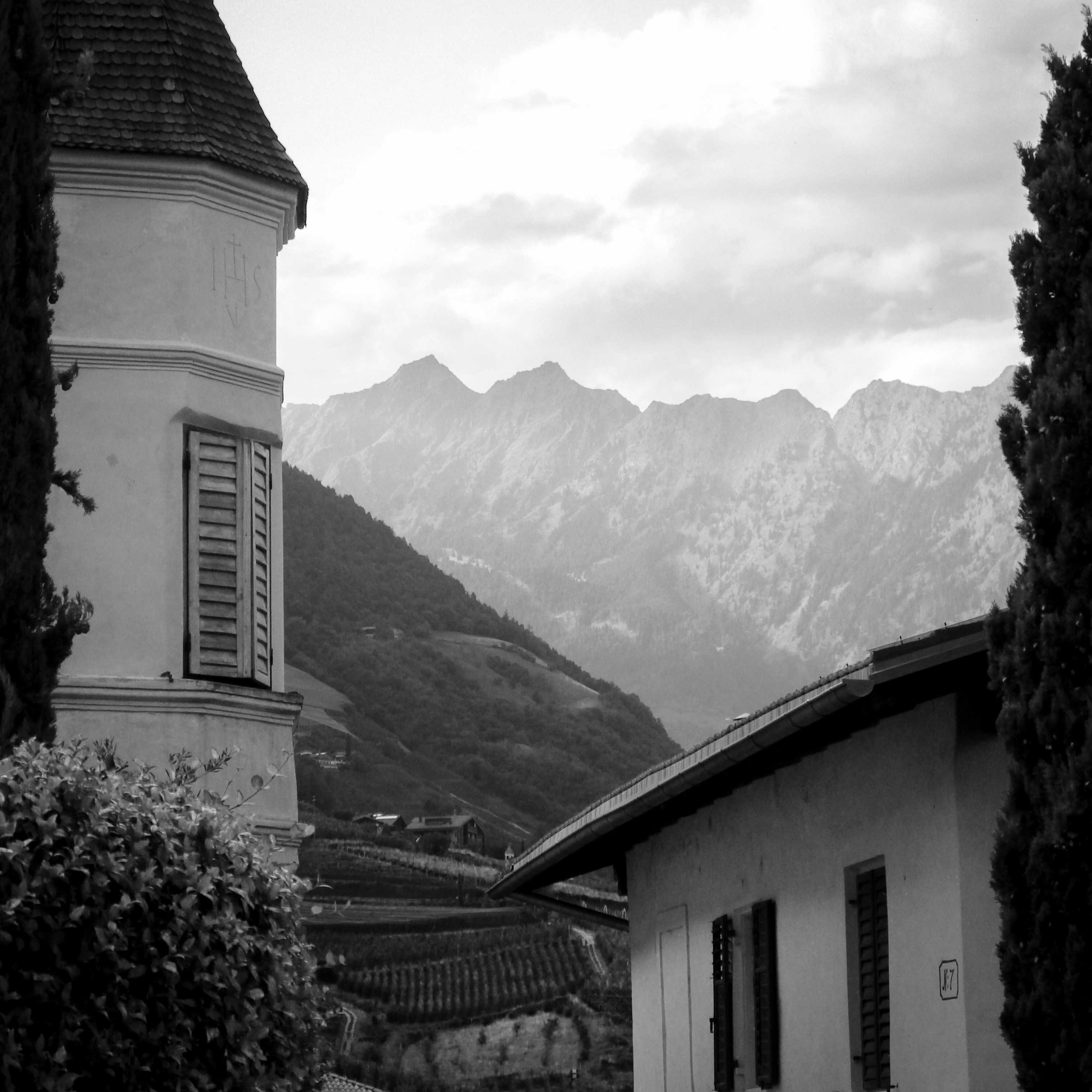 Mountain Village Facade Framed by Alpine Peaks