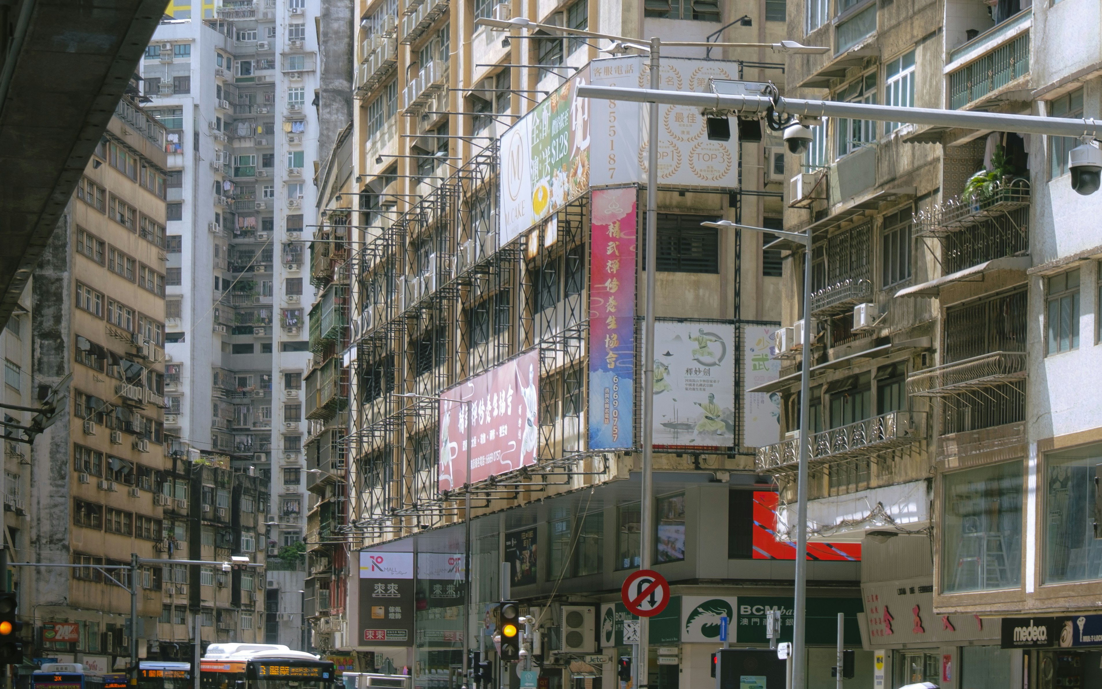 Urban Facade: A Narrow Corridor of Neon and Concrete