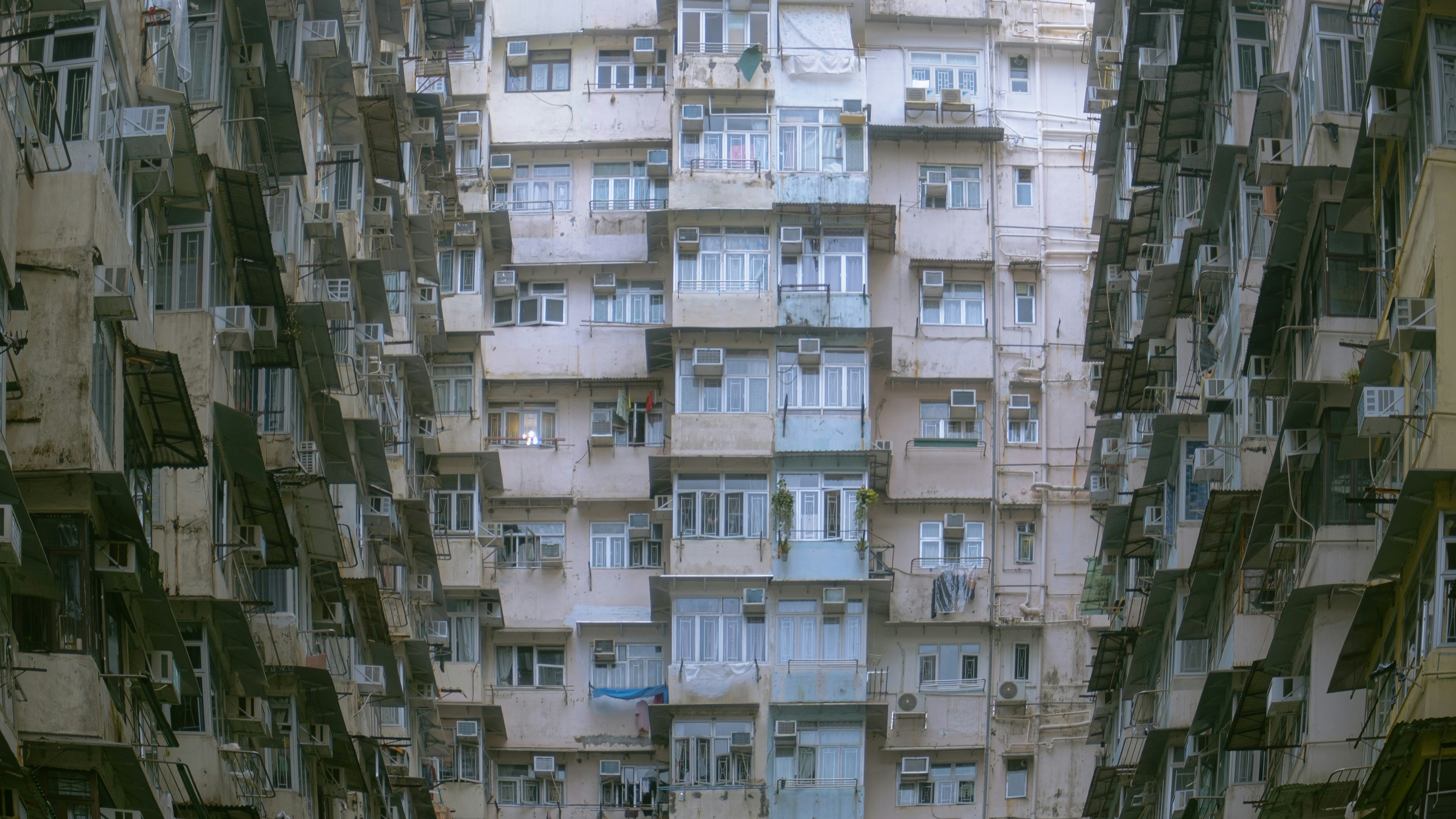 Grid of Windows: A Vertical City Stack.