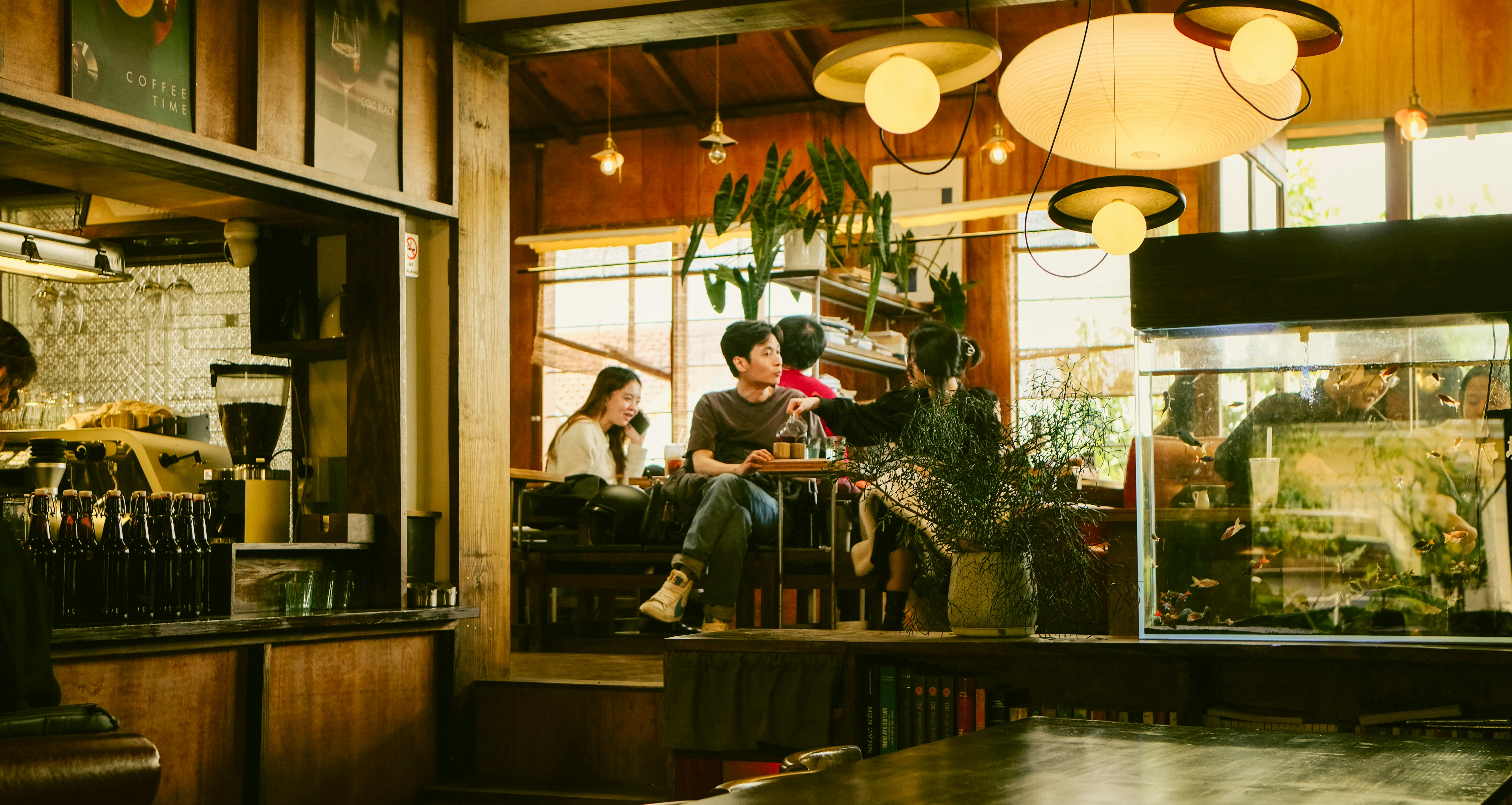 Midday Glow in a Cozy Café: Friends Console and Converse