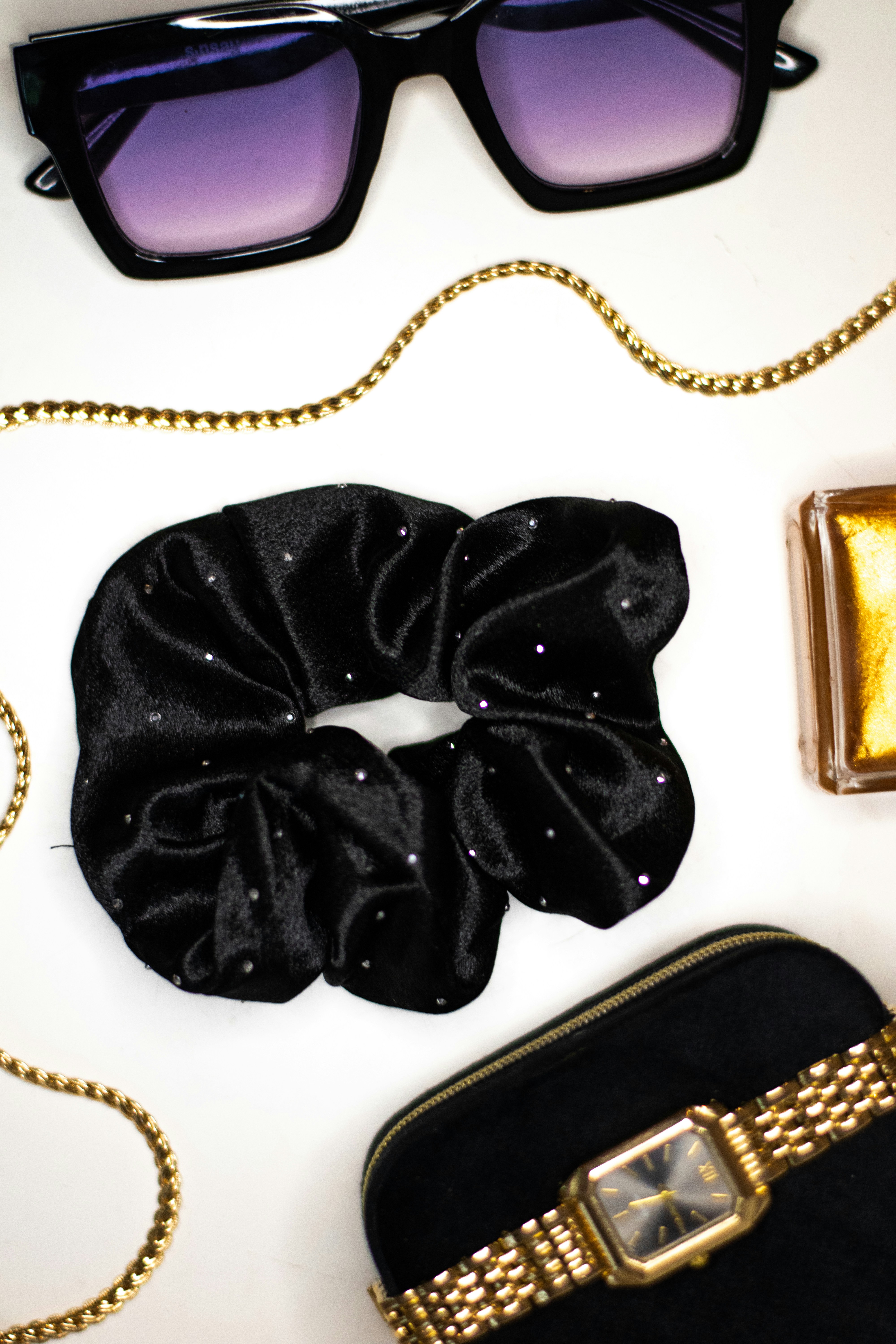 Gloss and Gleam: A Flatlay of Evening Accessories