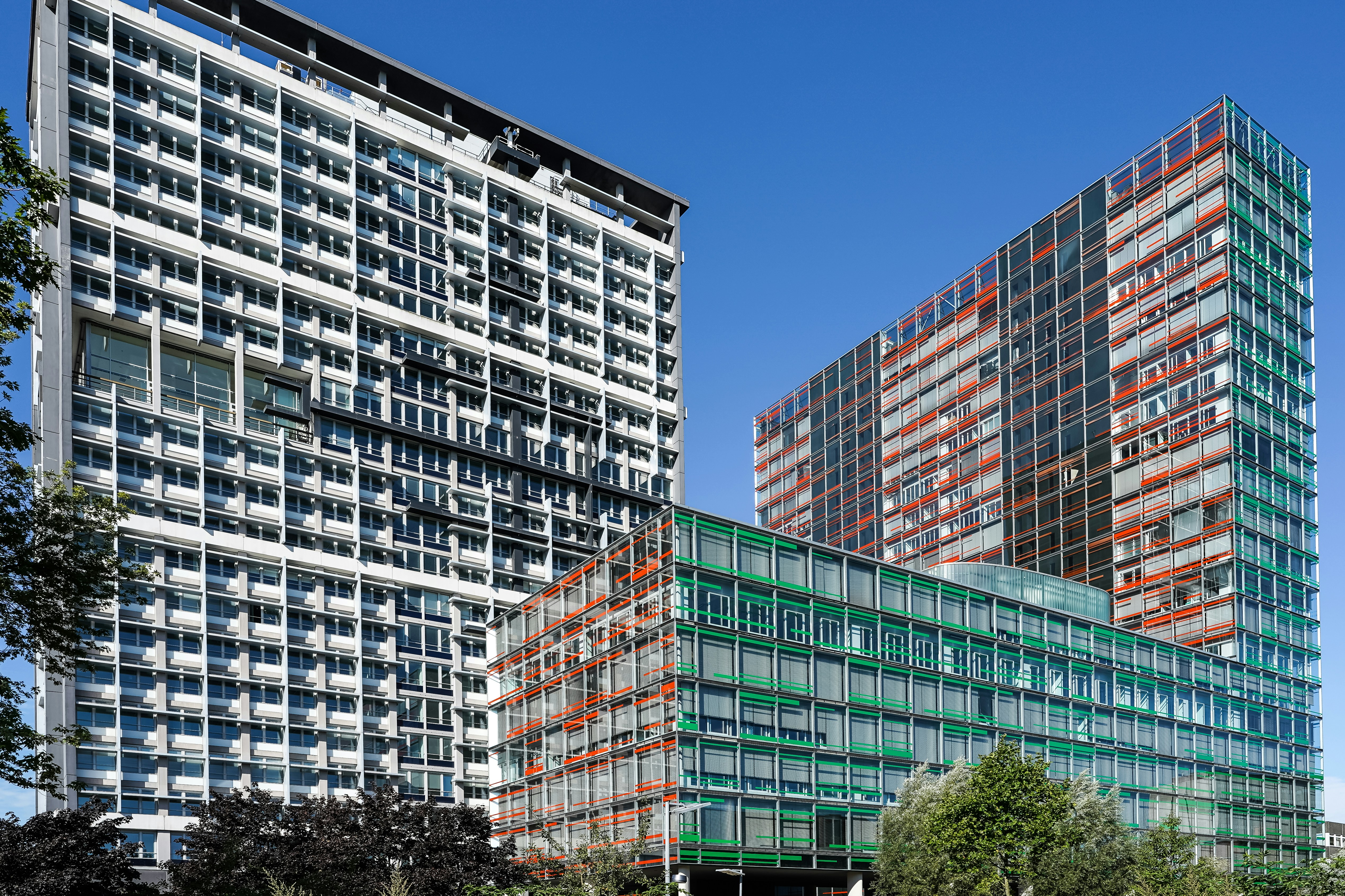 Urban Prism: A Pair of Modern Towers Under a Bold Blue Sky