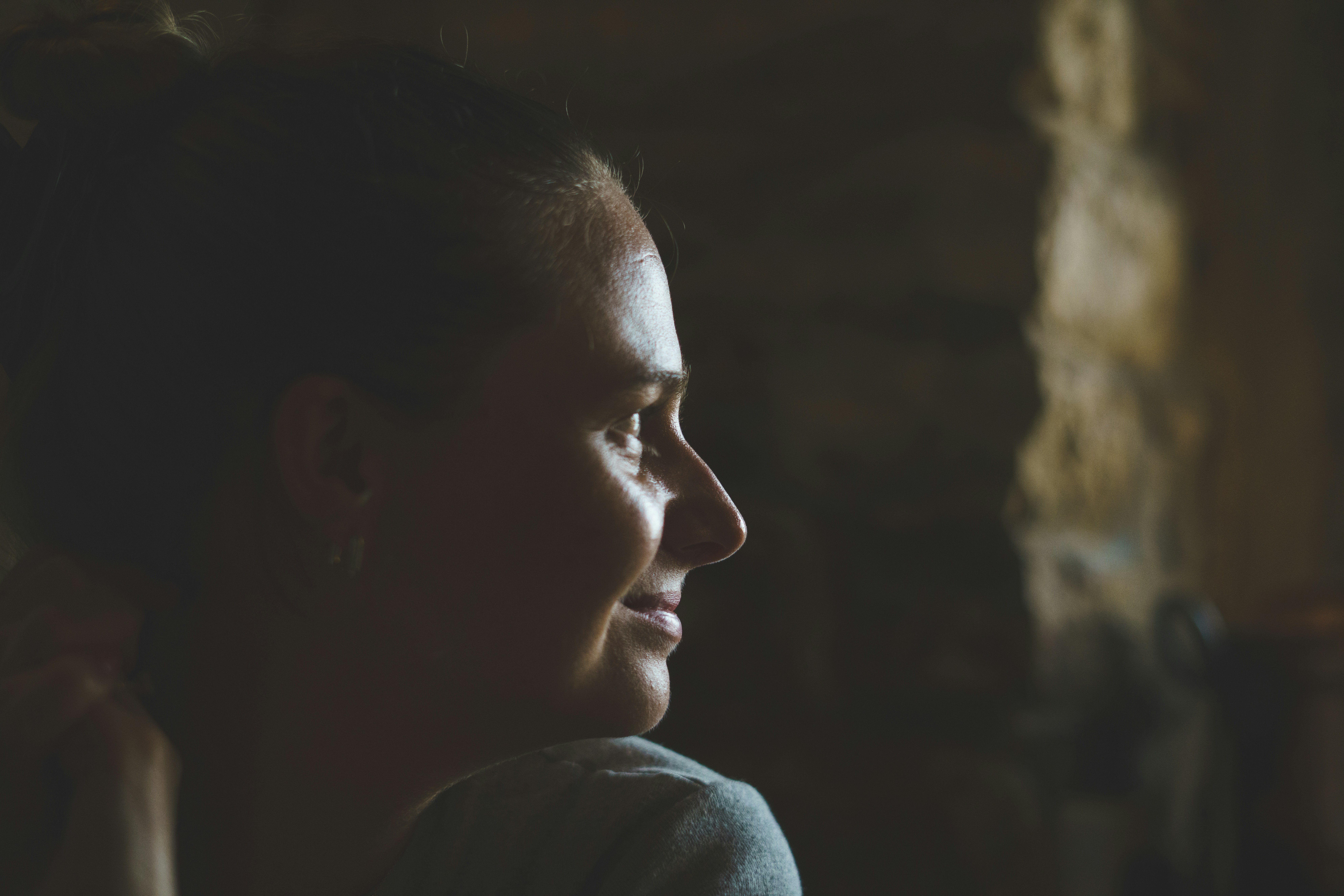 Quiet Profile by the Window: A Portrait in Low Light