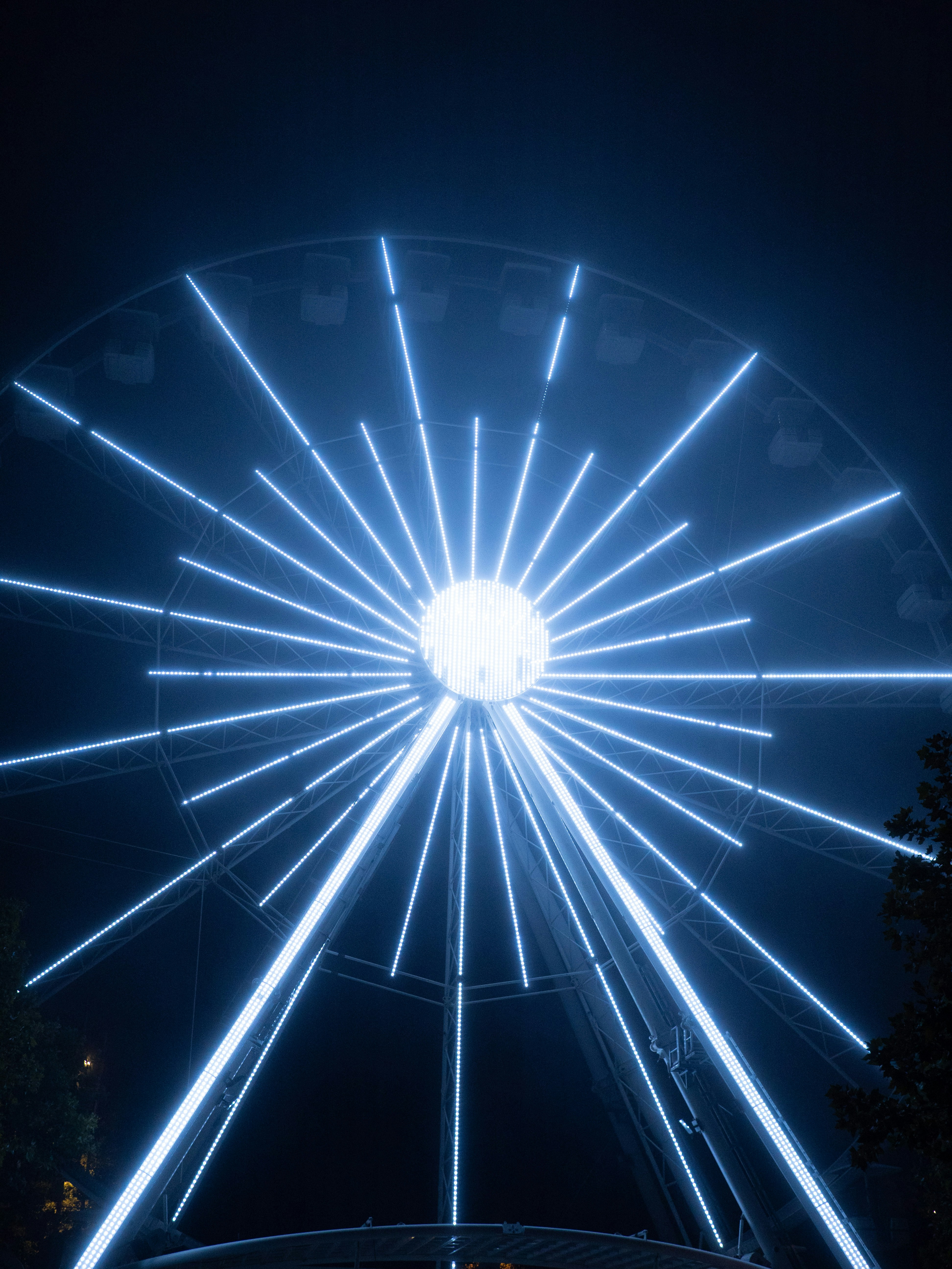 Neon Spokes: A Nighttime Ferris Wheel Pulse