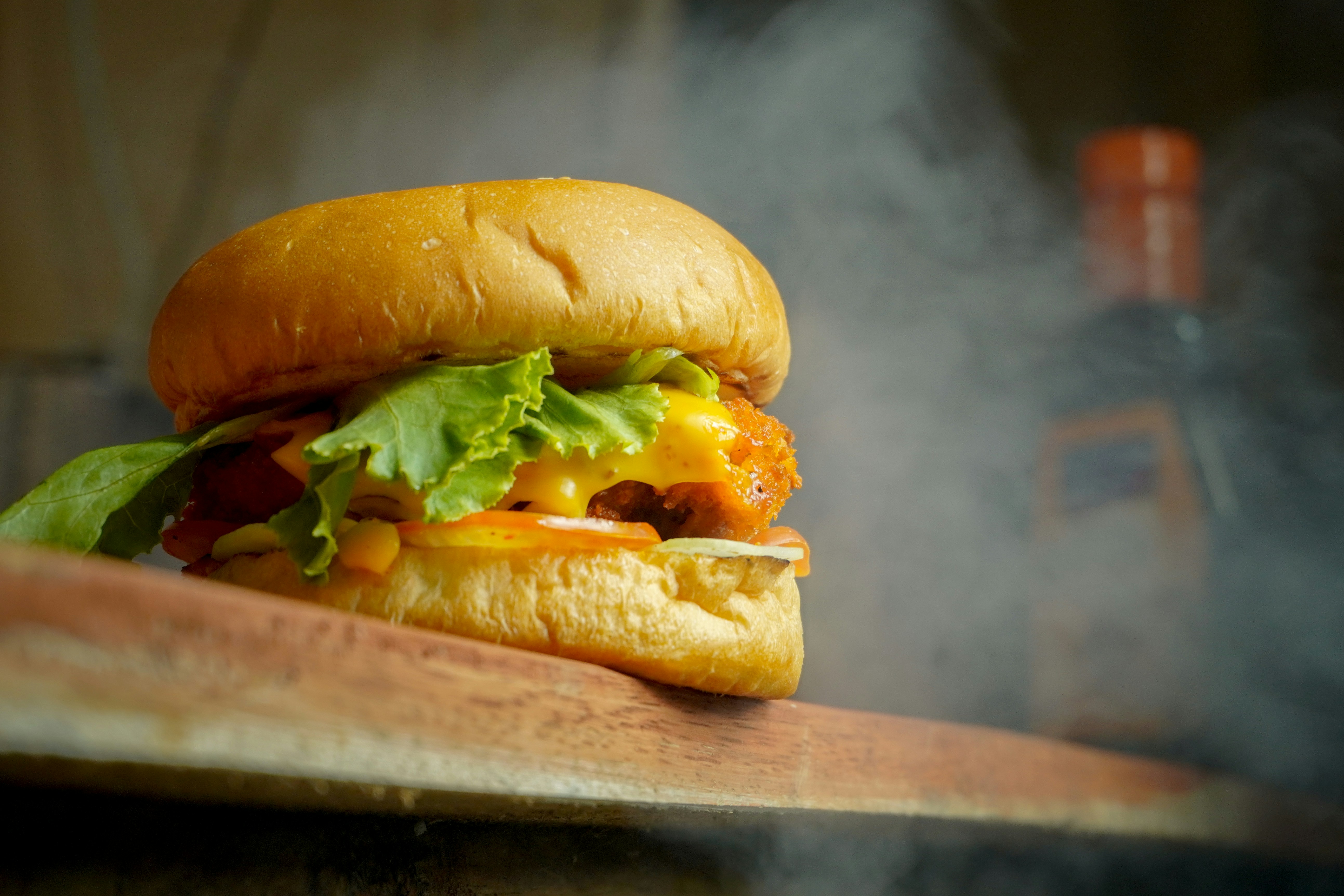 Charred Convenience: A Smoky Burger Dominates a Quiet Griddle Moment