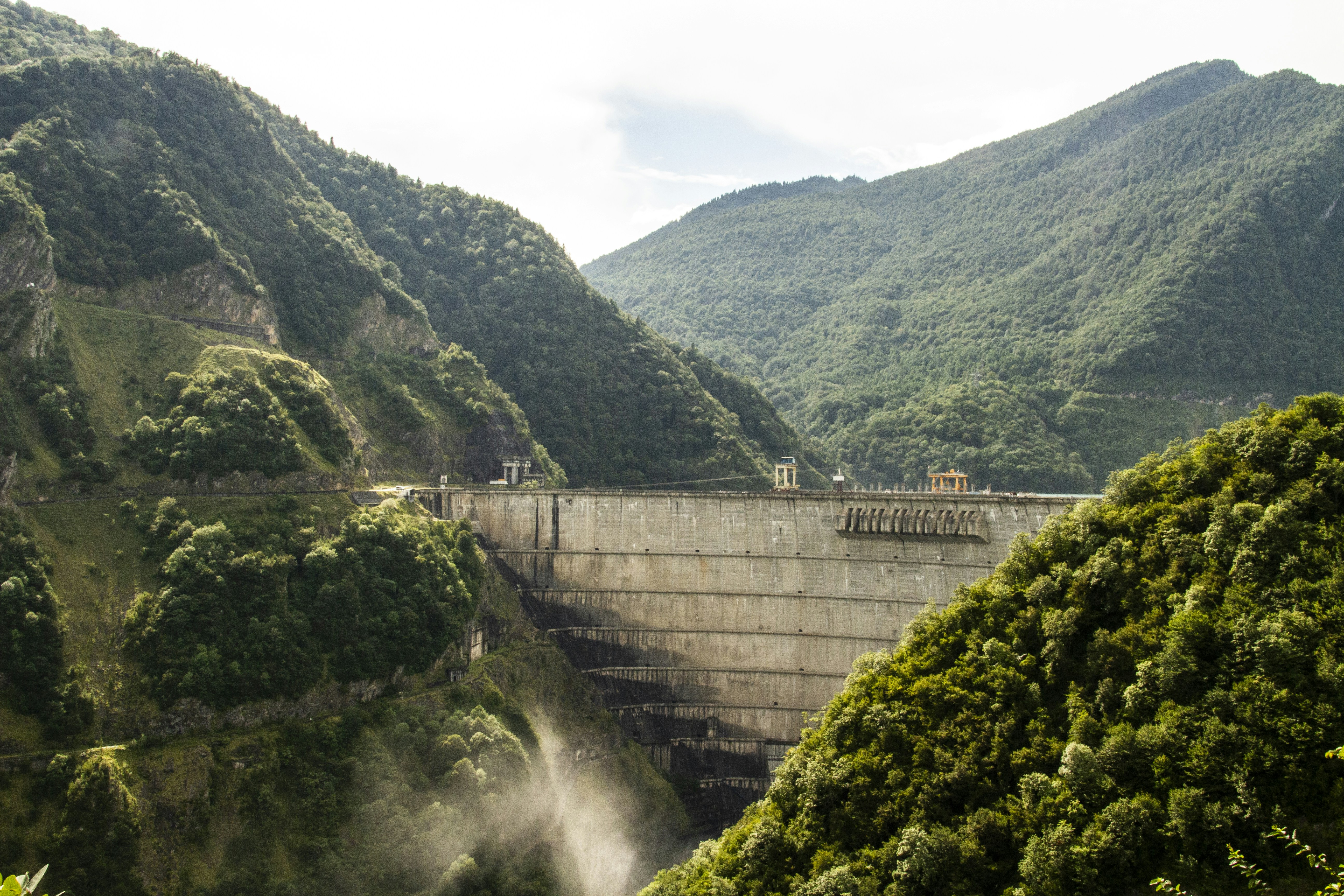 Echoes of the Gorge: A Dam Carved Between Green Giants