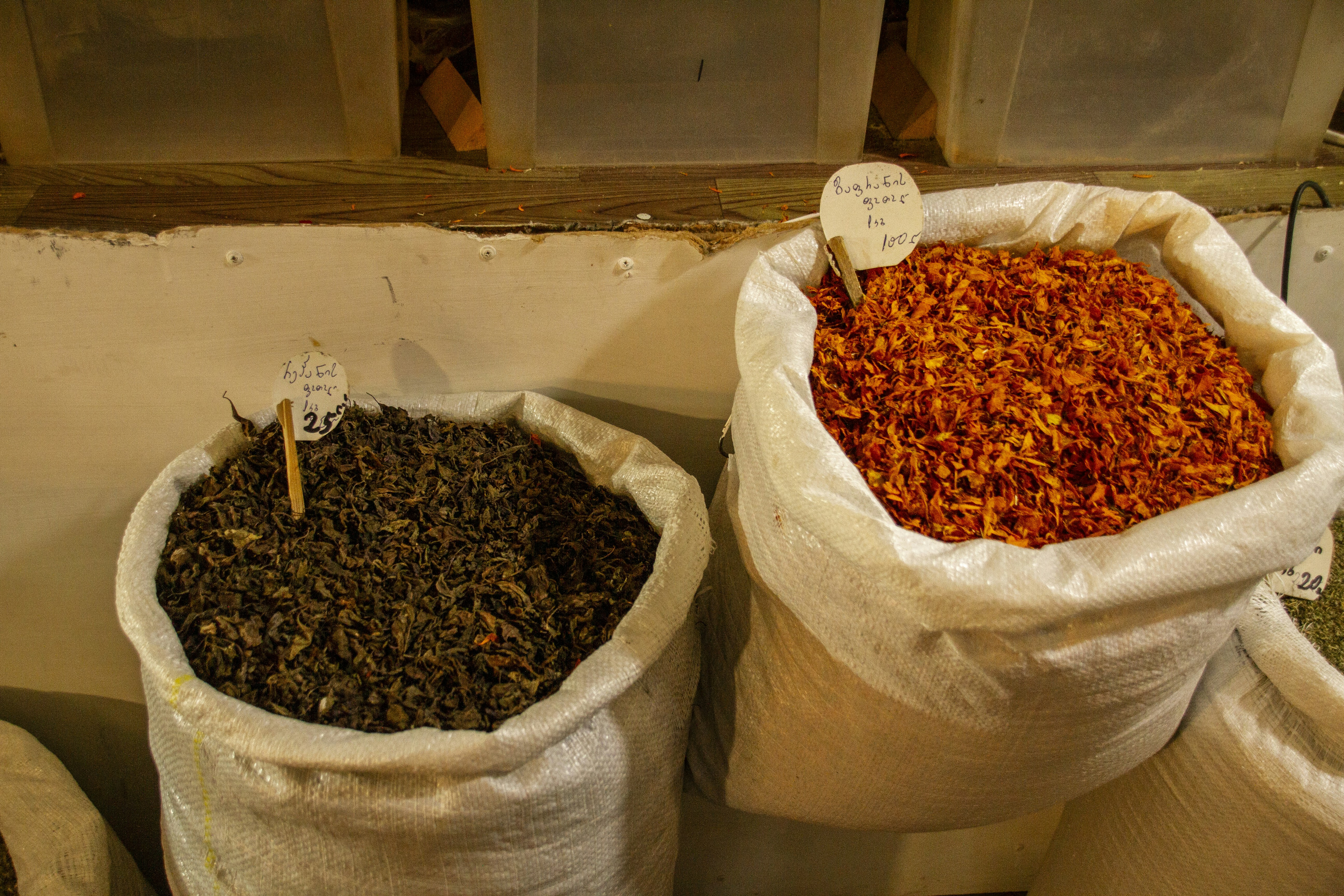 Bags of Dried Goods in a Market Stall