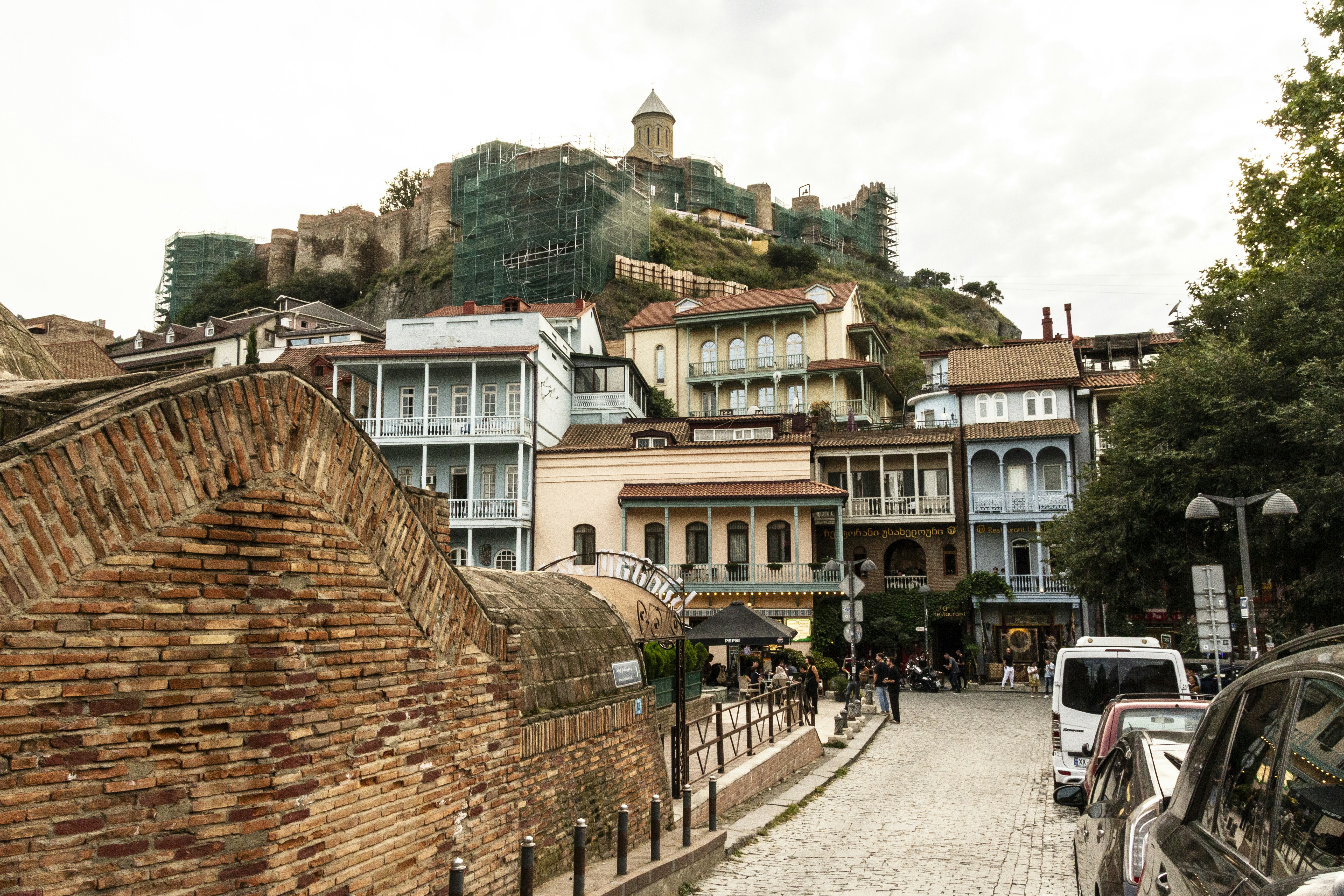 Cobbled Path Toward a Hilltop Village