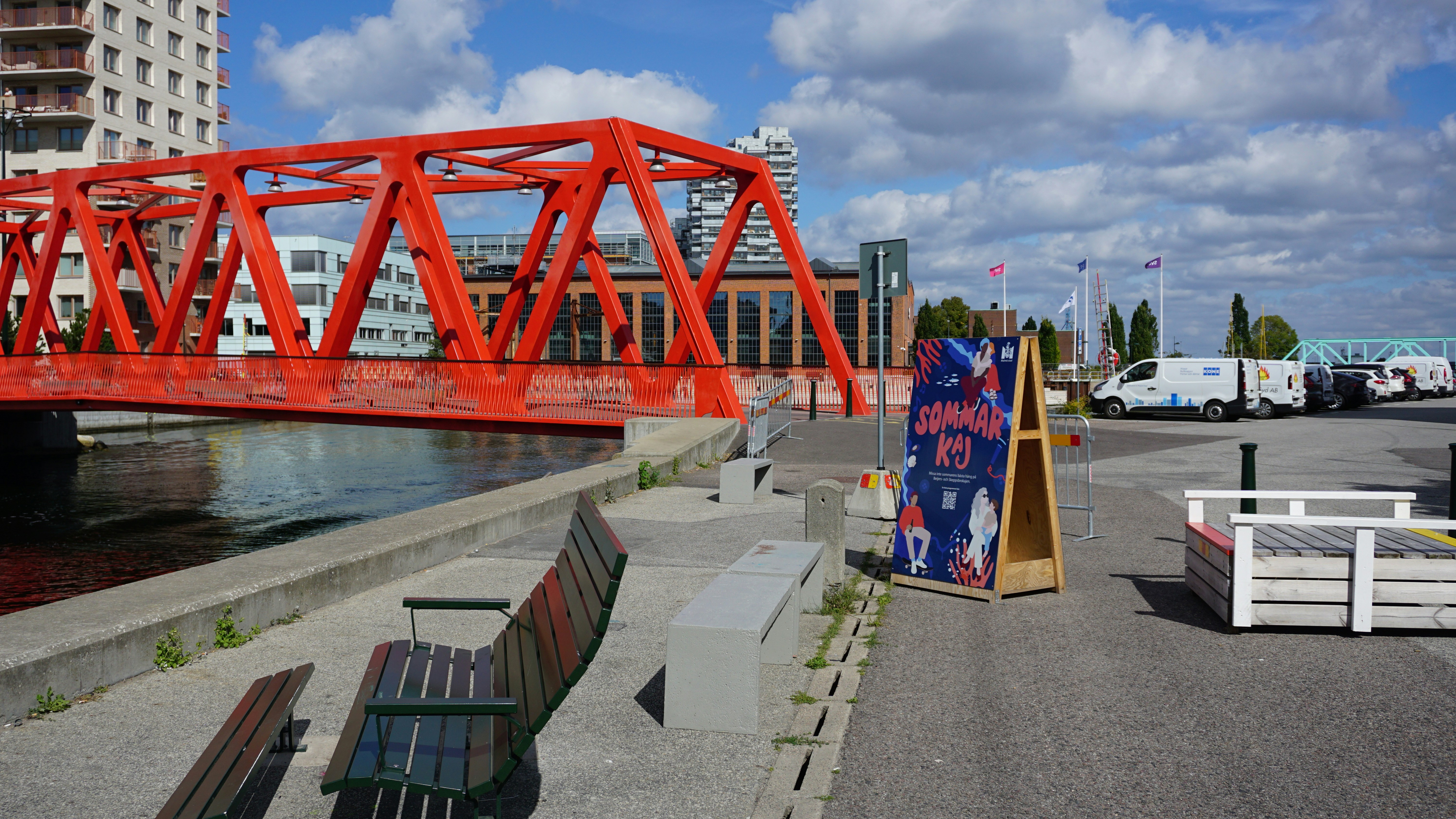 Crimson Truss: A Red Bridge Across a Quiet Harbor