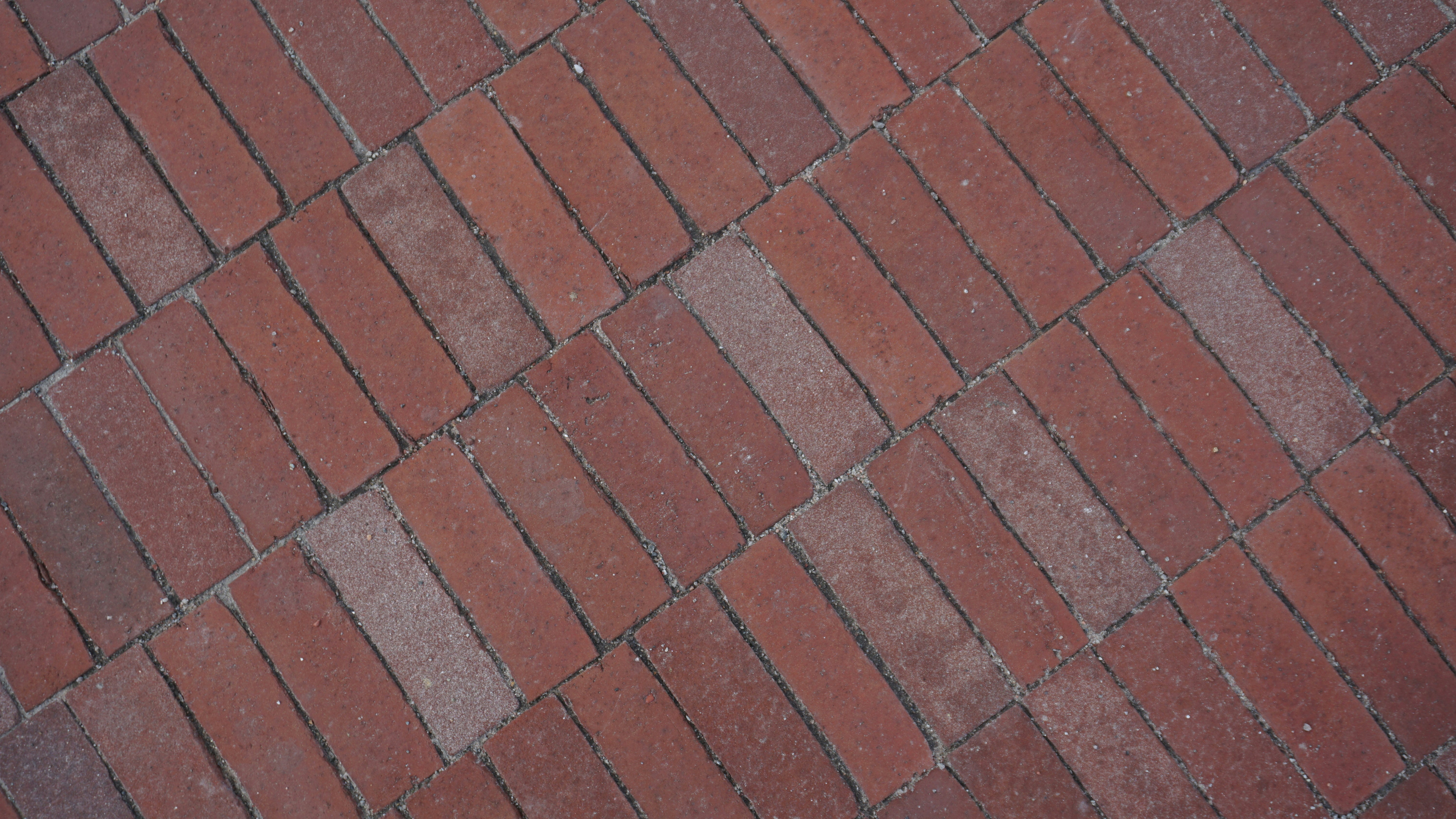 Brickwork Rhythm: Evening Light Tracing a Quiet Path