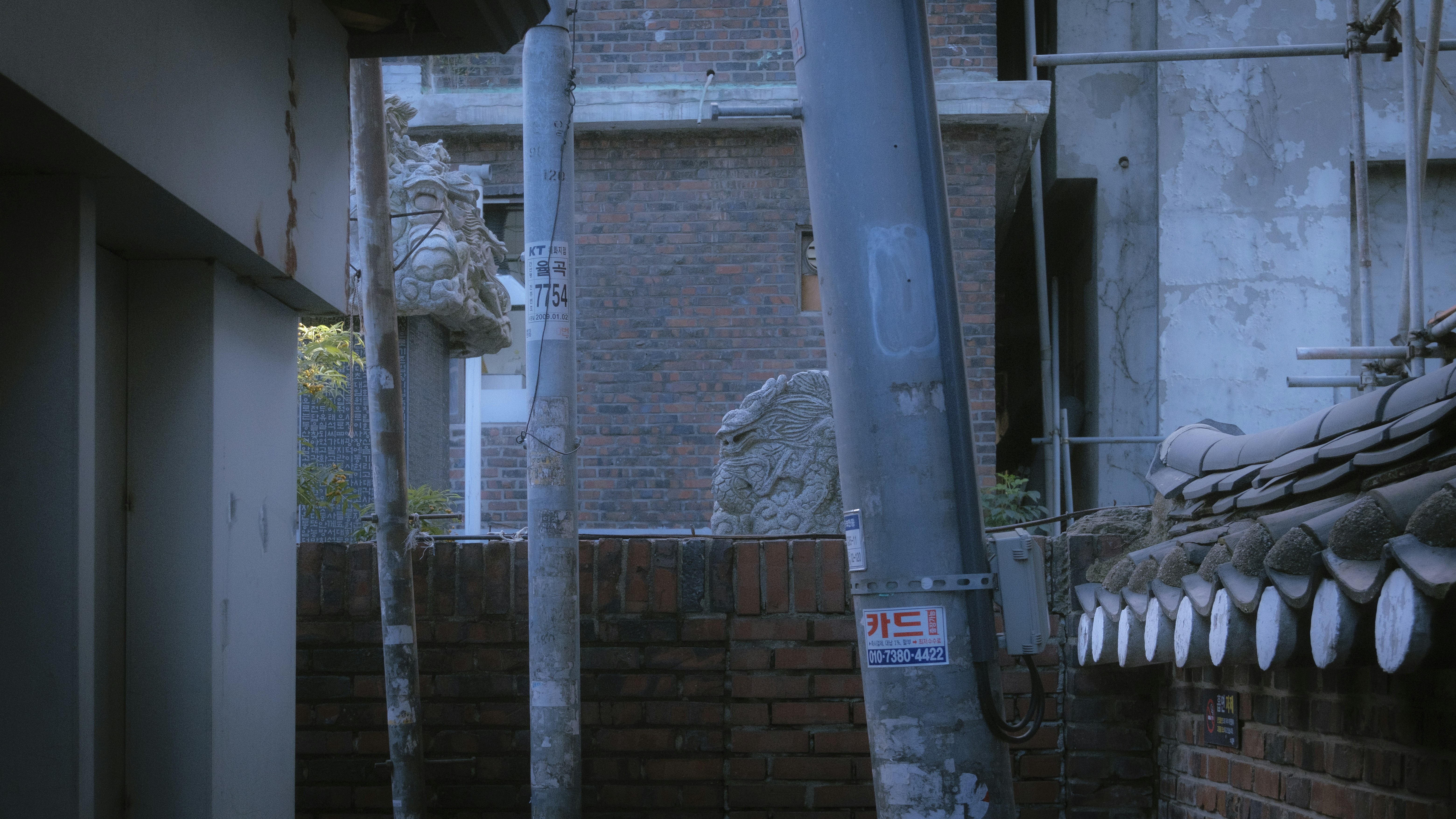 Urban Scaffold Between Brick Walls