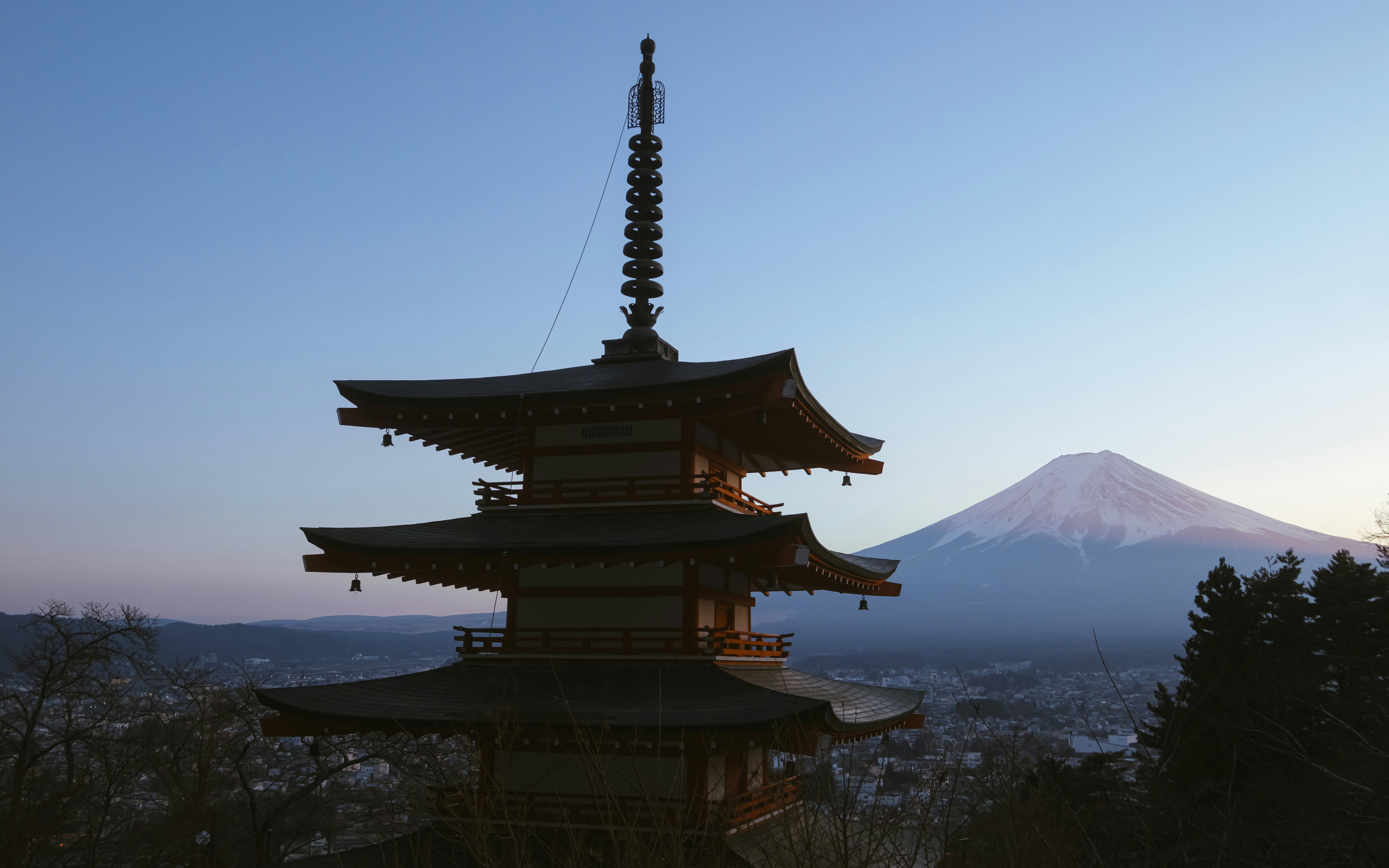 Twin Peaks of Tradition and Snow: A Five-Tlo Pagoda with Mount Fuji in the Distance