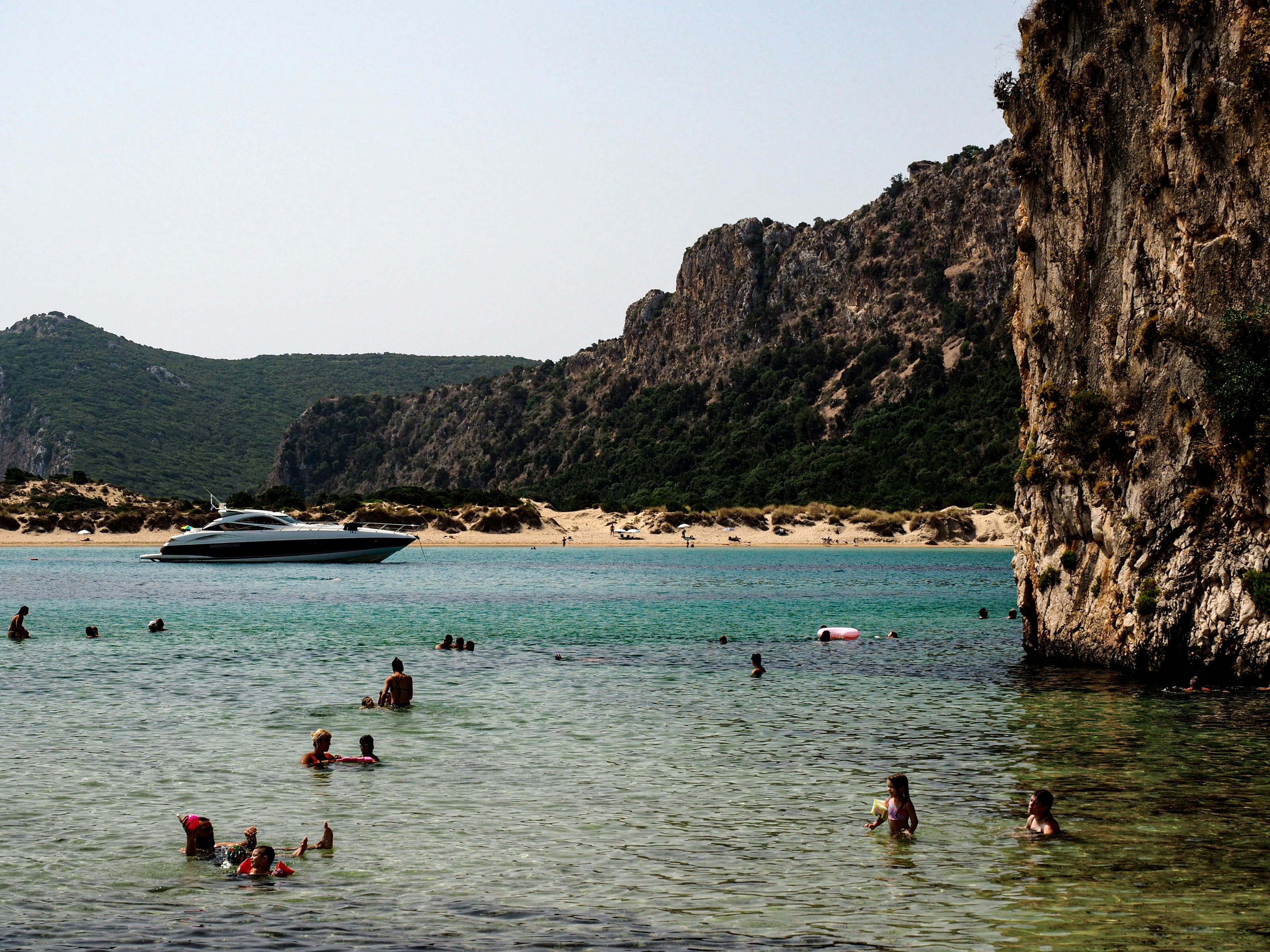 Hidden Cove: A Pebble Beach Picnic Beneath Towering Cliffs