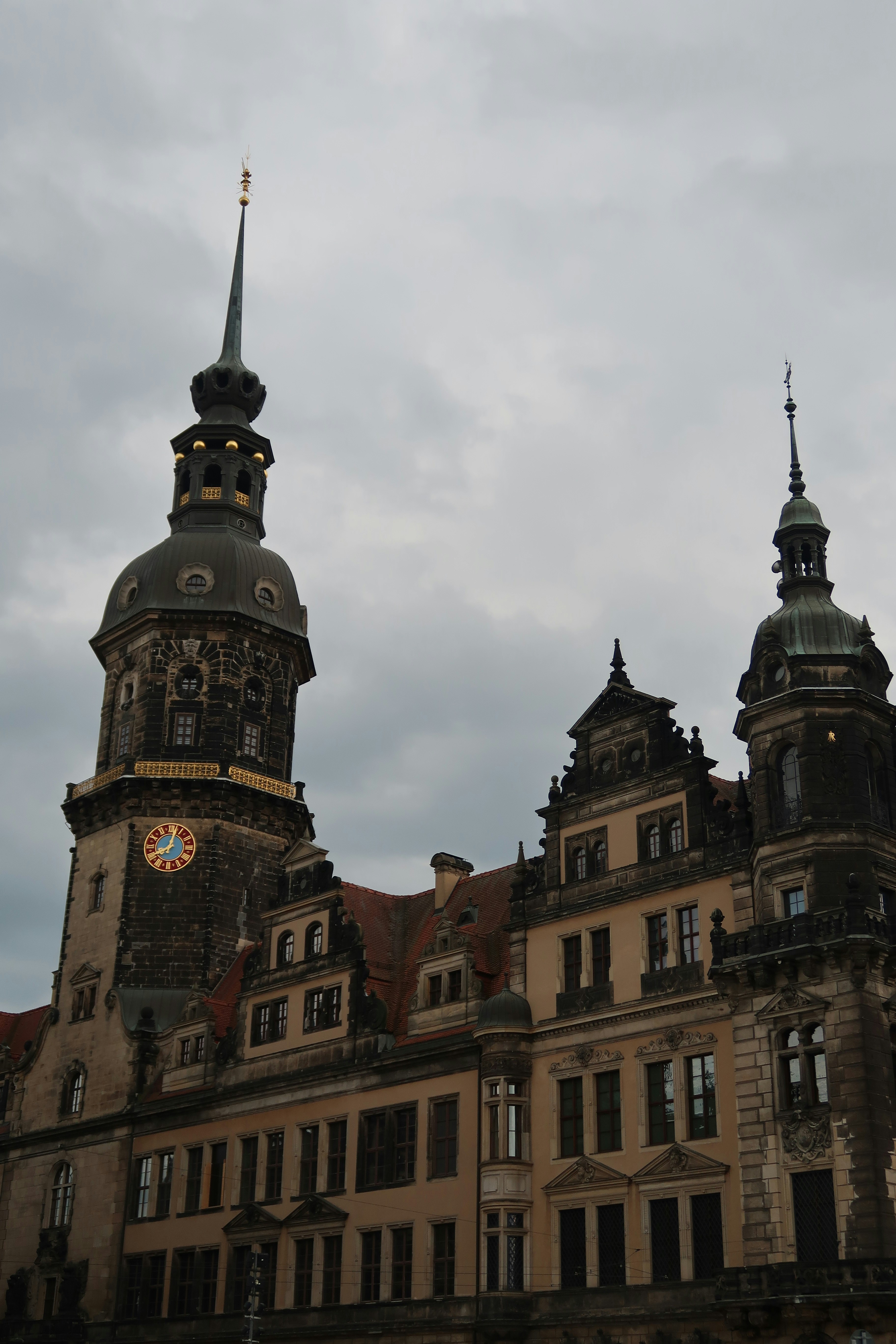 Clocktower Crowned Facade: A Quiet Symphony of Spires Over a Historic Centre