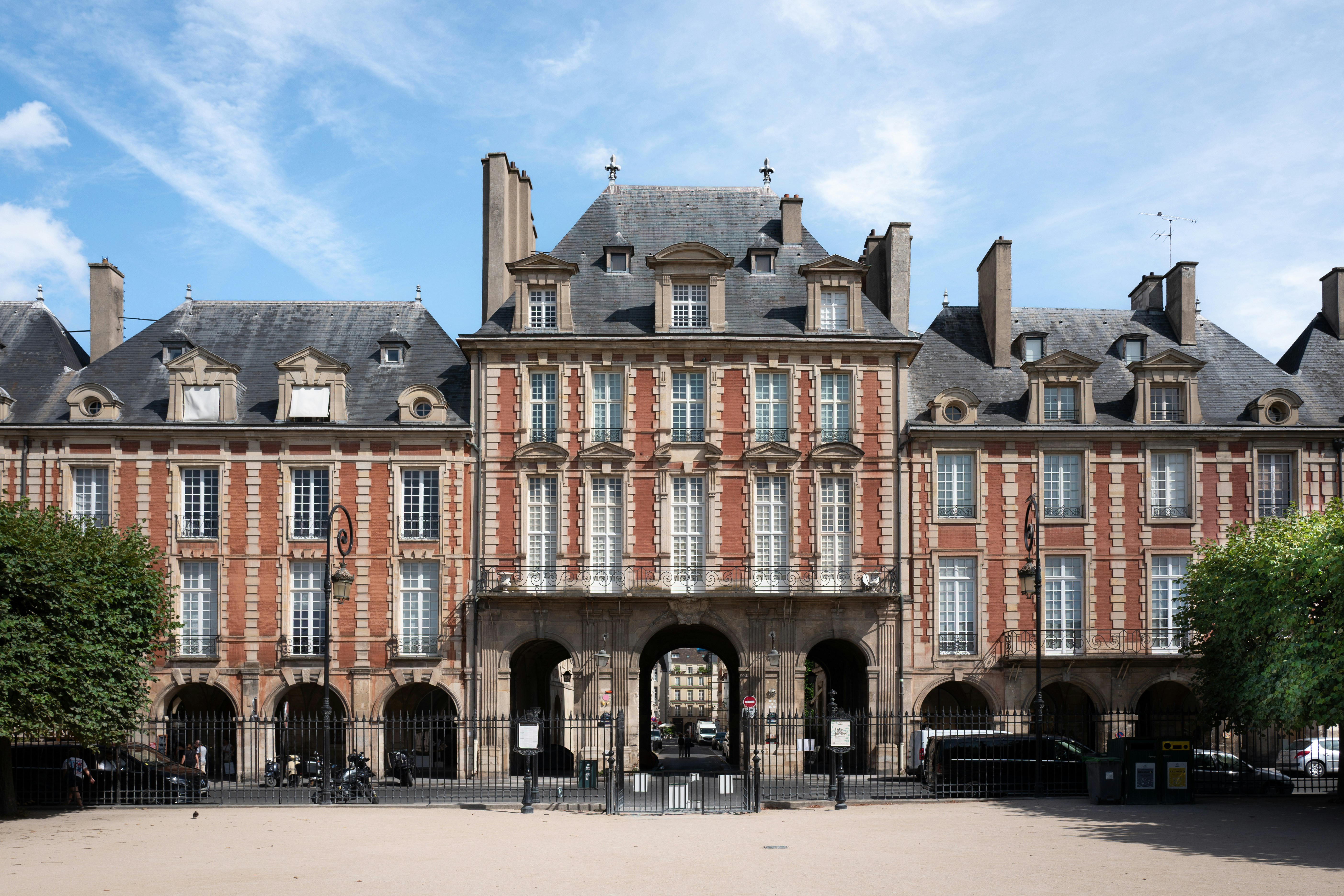 Gateway to the Old Palace: Symmetry and Stonework Under a Blue Sky