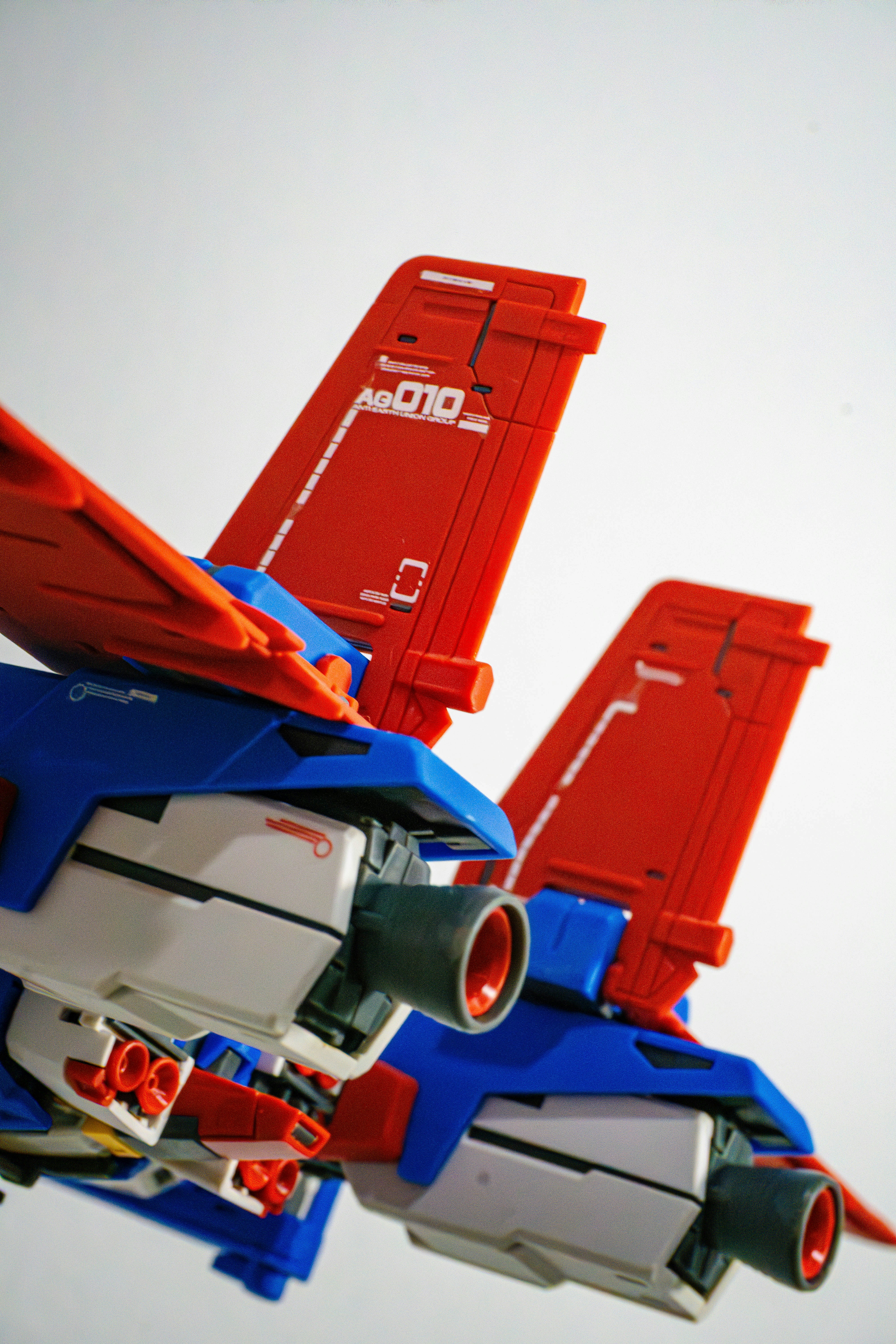 Red-Blue Jet Mech in Flight Adrift