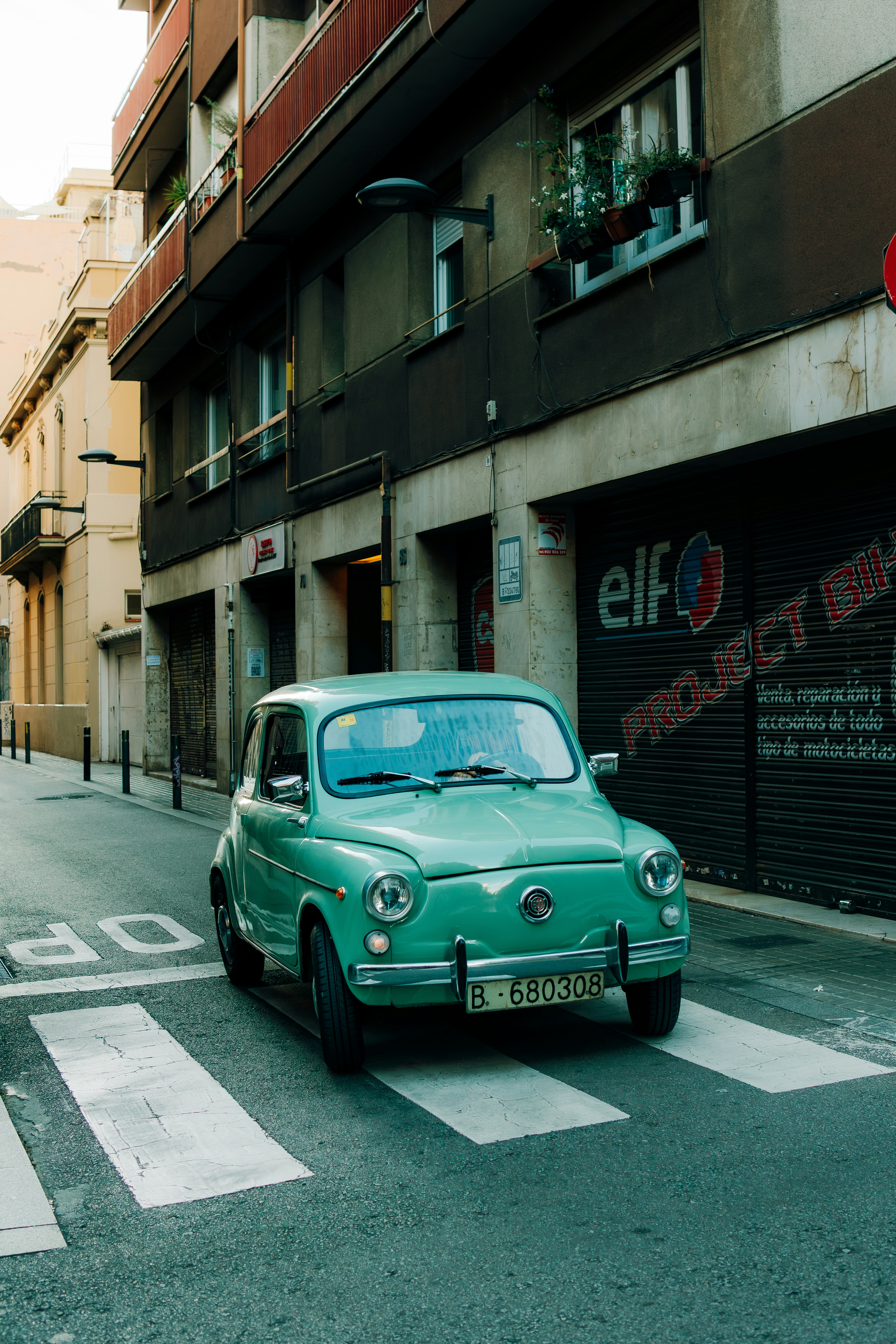 Mint Fiat on a Quiet European Street