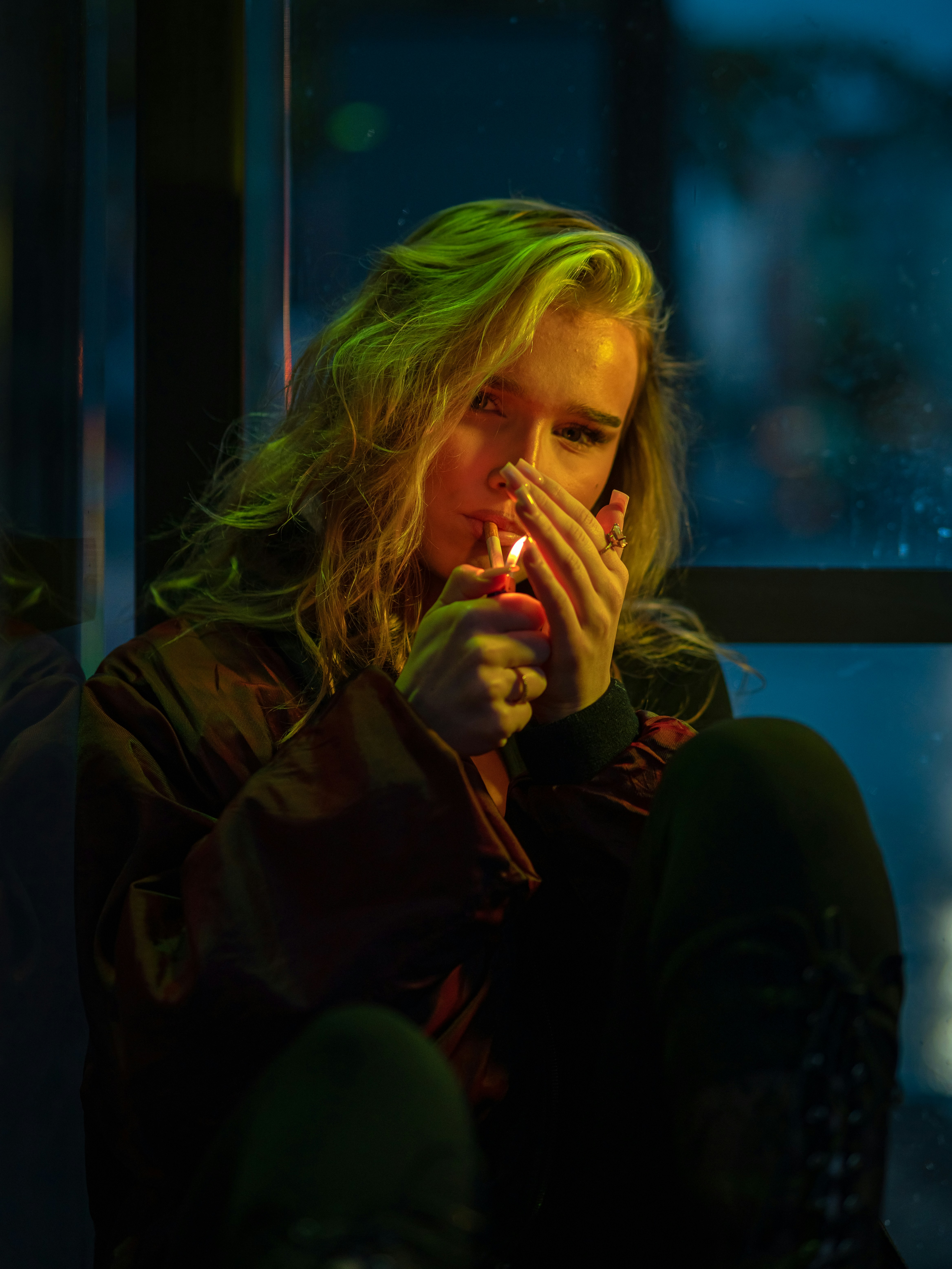 Candlelit Quiet: A Woman in Neon Night