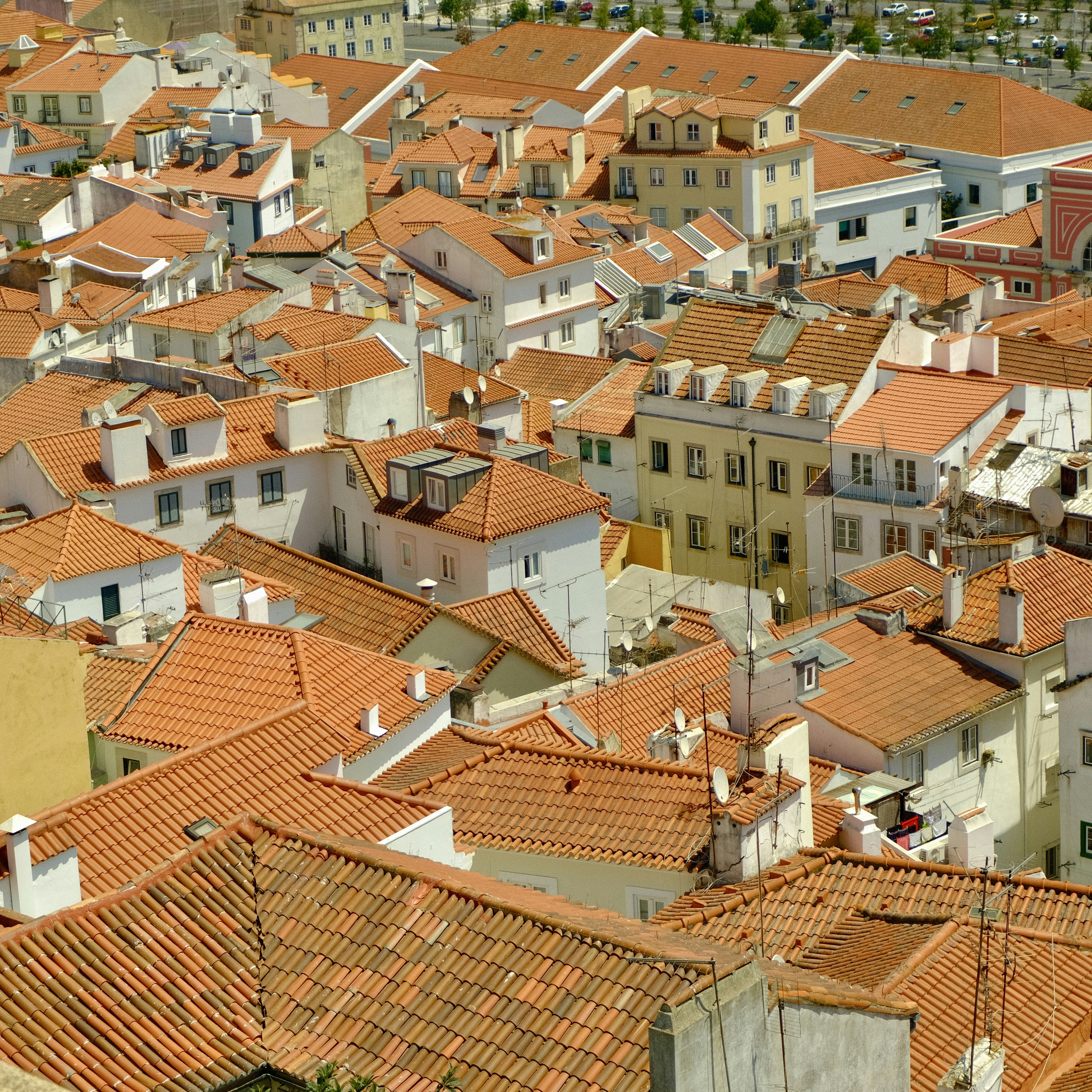 Terracotta Rooftop Maze: An Aerial Patchwork of Mediterranean Homes