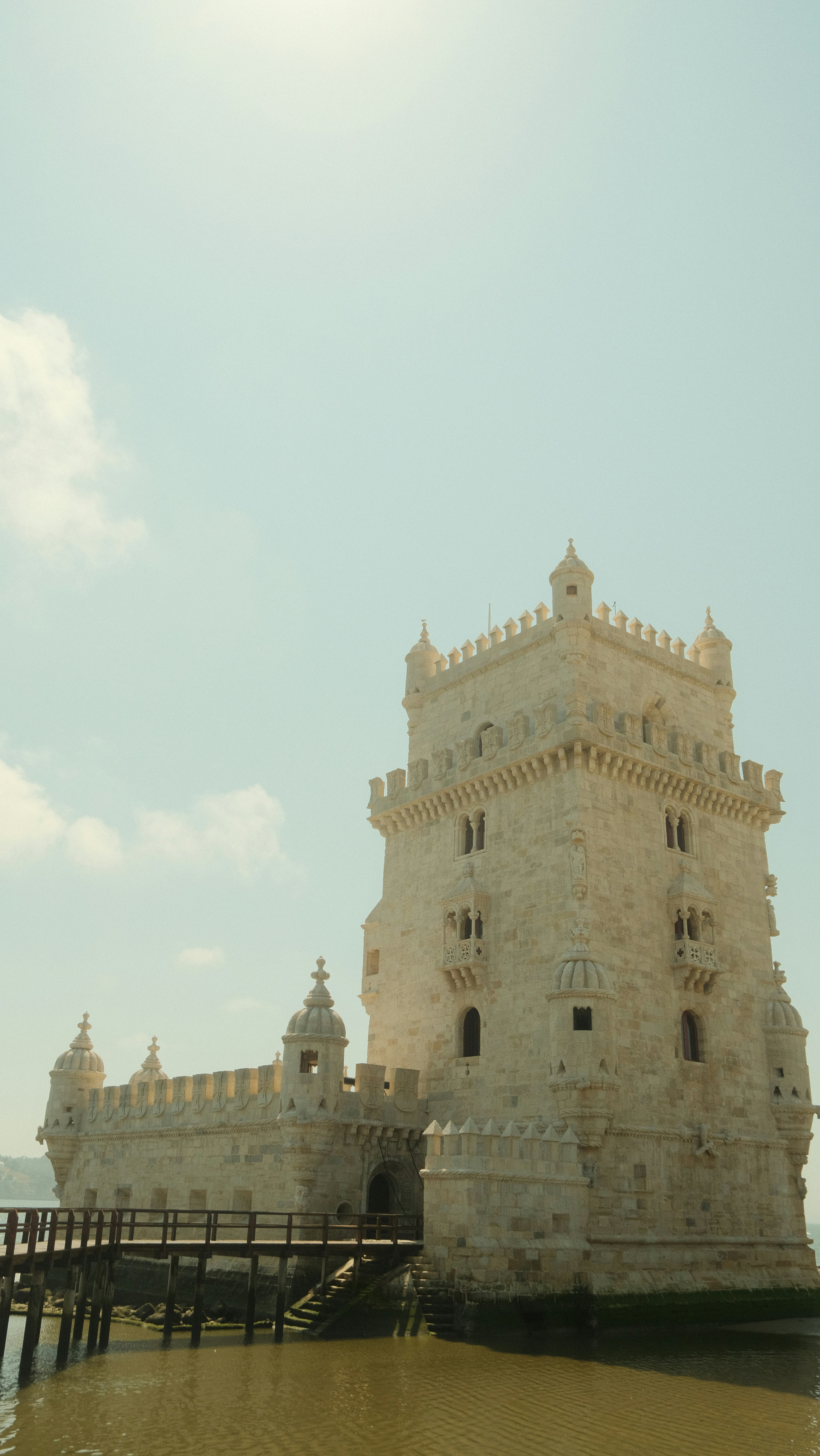 Castle on the Sea: A Solitary Templar Spire Rising from Golden Waters
