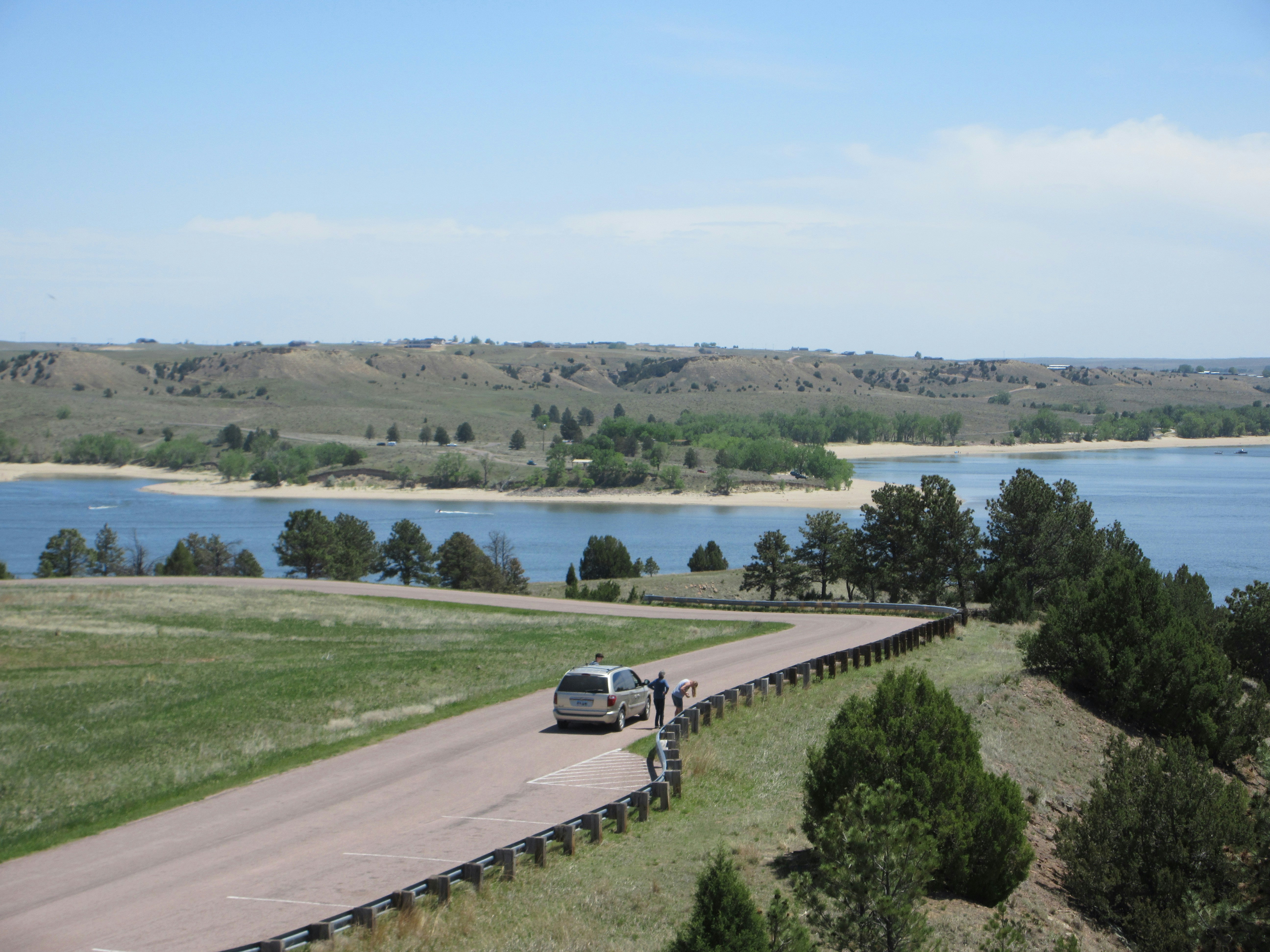 Carの Adventure: A Scenic Road by the Lake