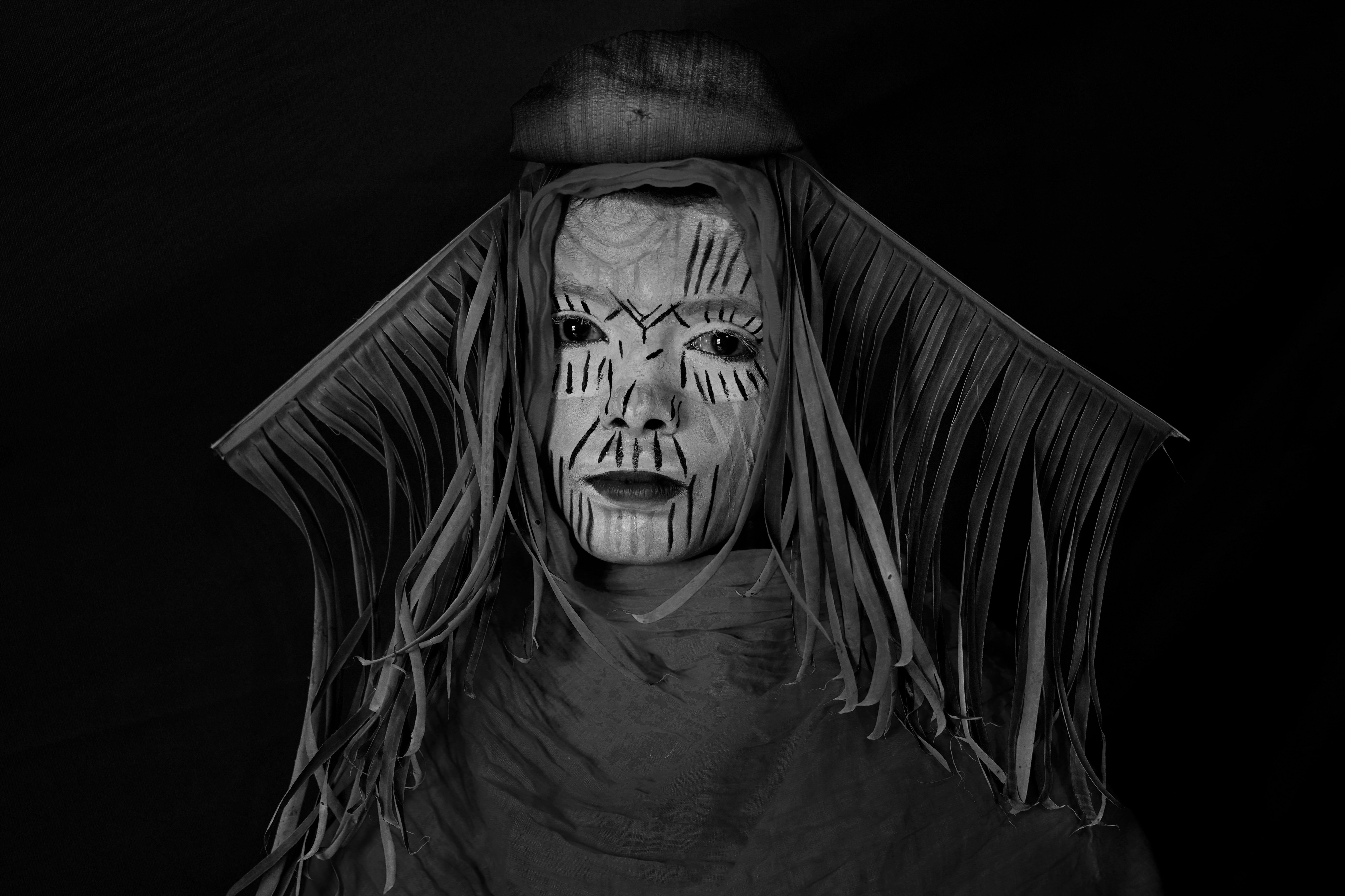 Masked Messenger: A Portrait of Ritual Echoes