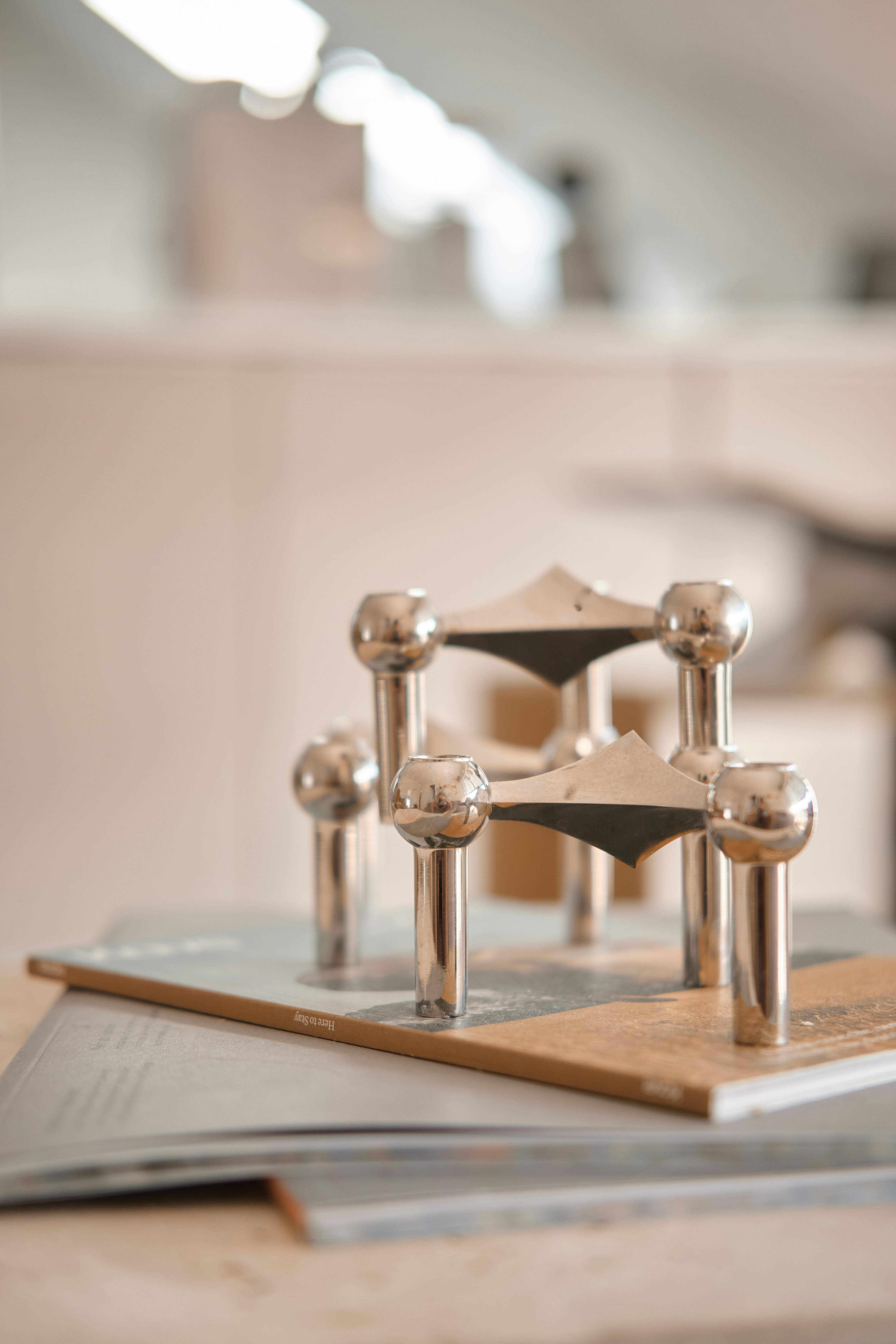 Metallic Thimbles: A Sculpted Kitchen Study in Shiny Geometry