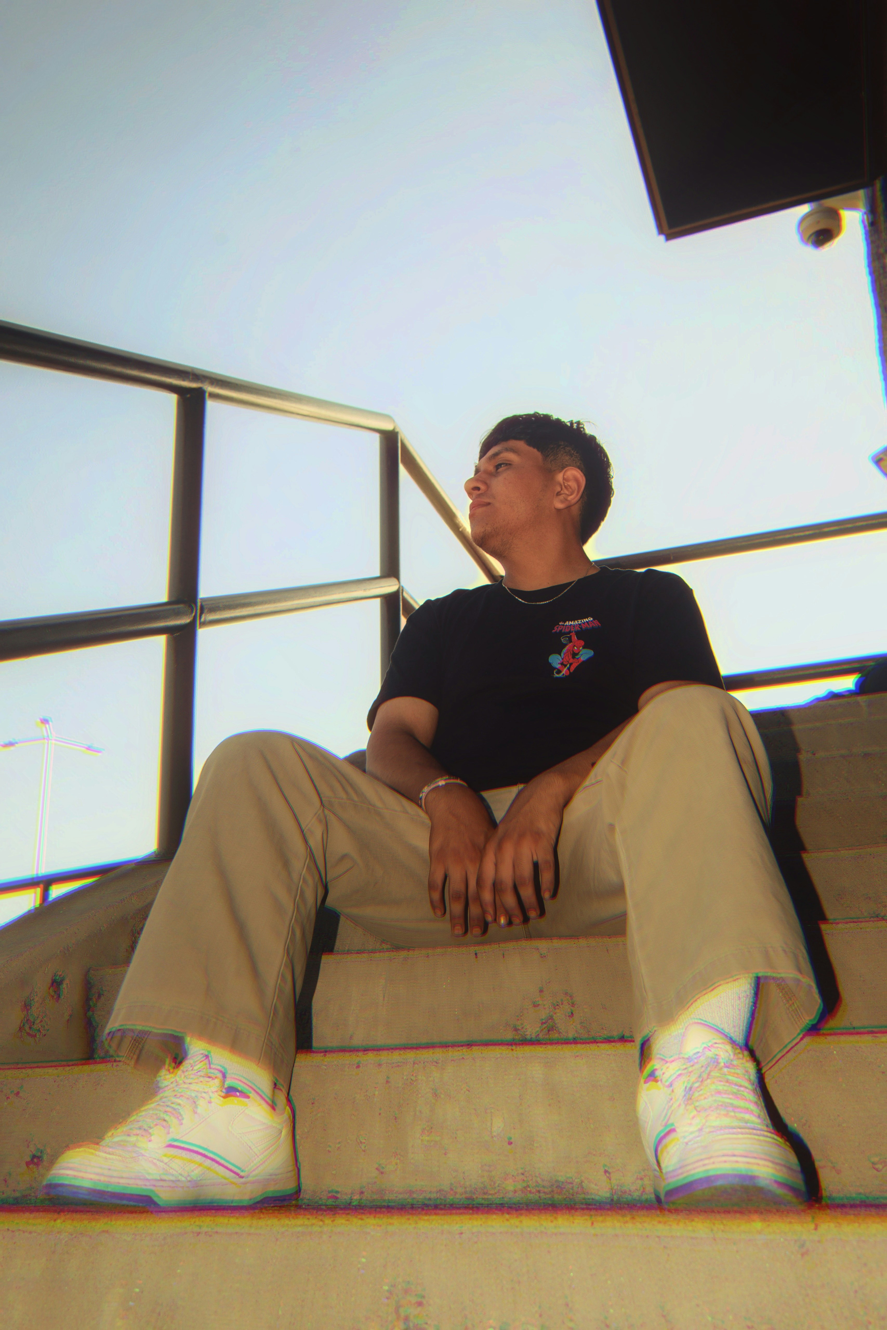 Sitting in the Sun: A Quiet Rooftop Portrait