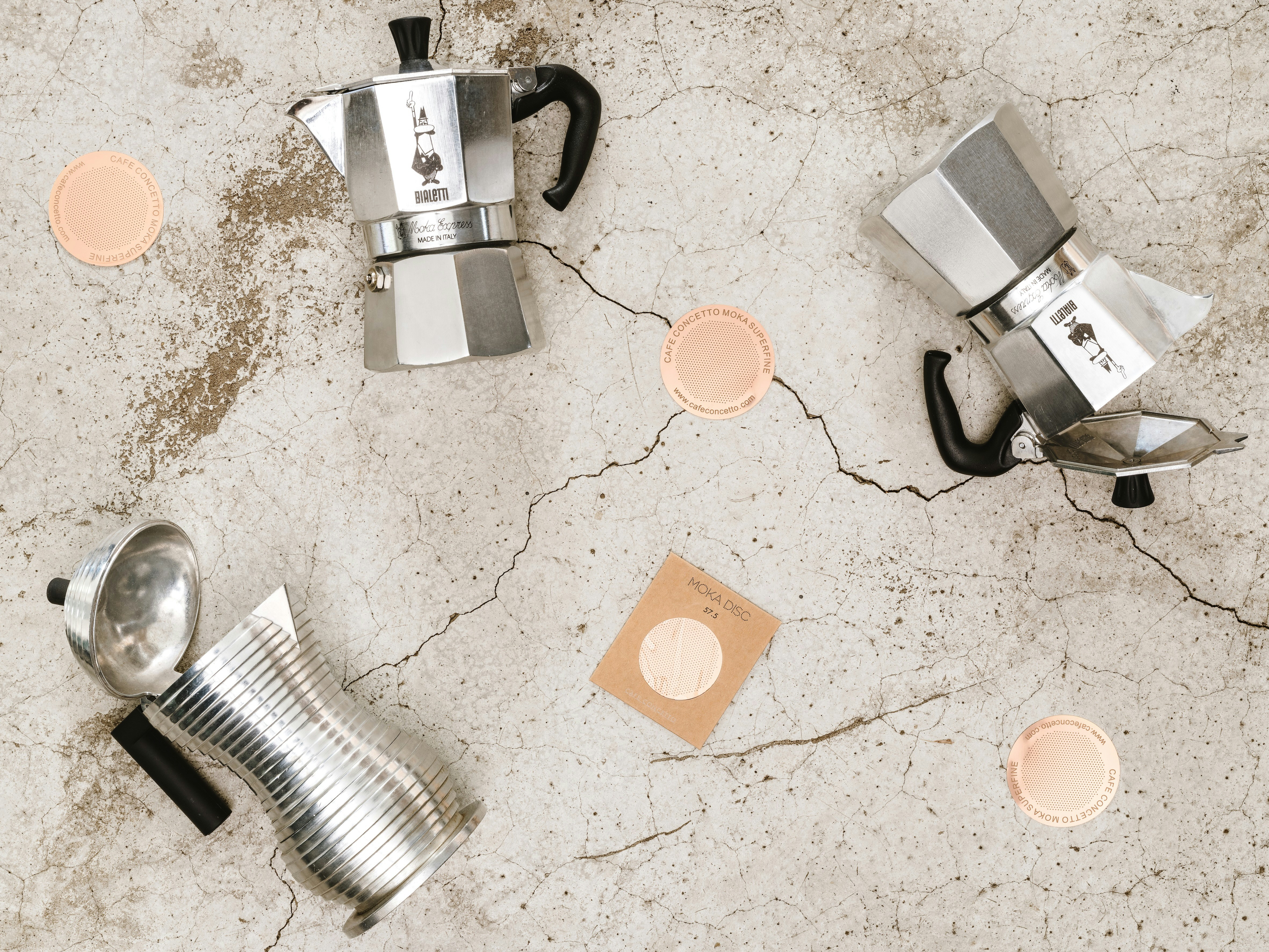 Cracked Concrete Café: Stilled Moments Between Espresso Gears