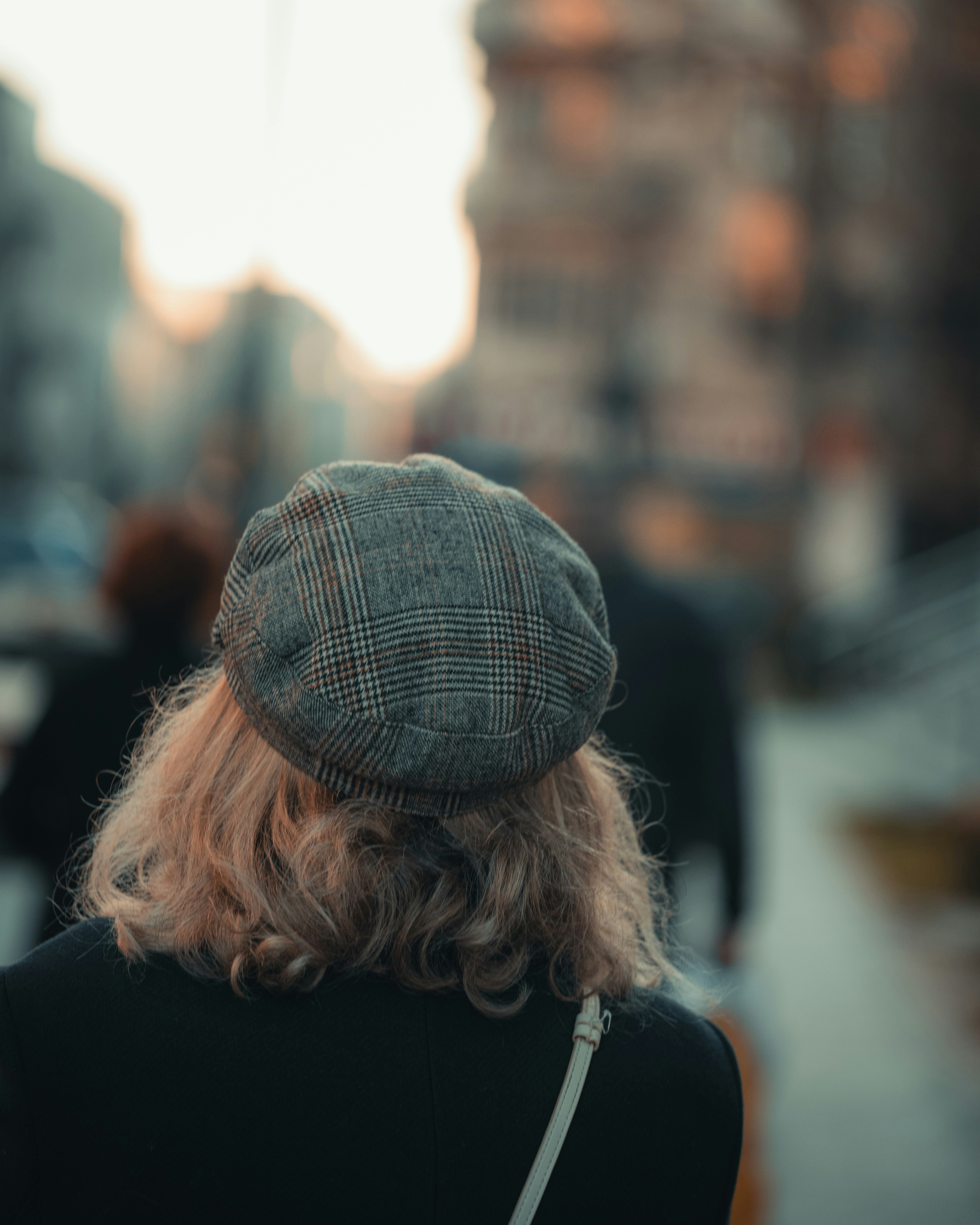 City Street Reverie: A Back View in Plaid and Evening Light