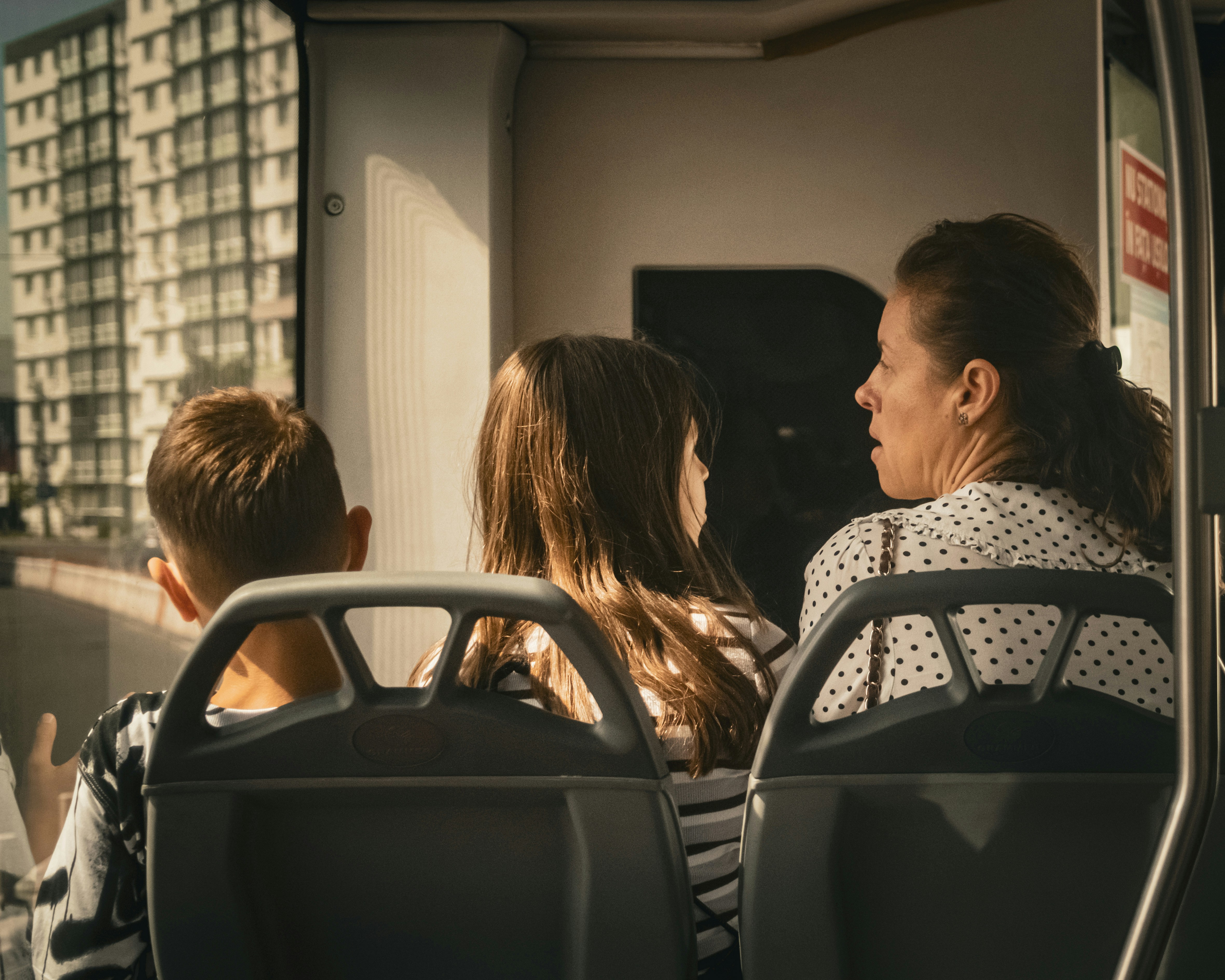 Shared Silence on the Bus: A Moment Behind the Window