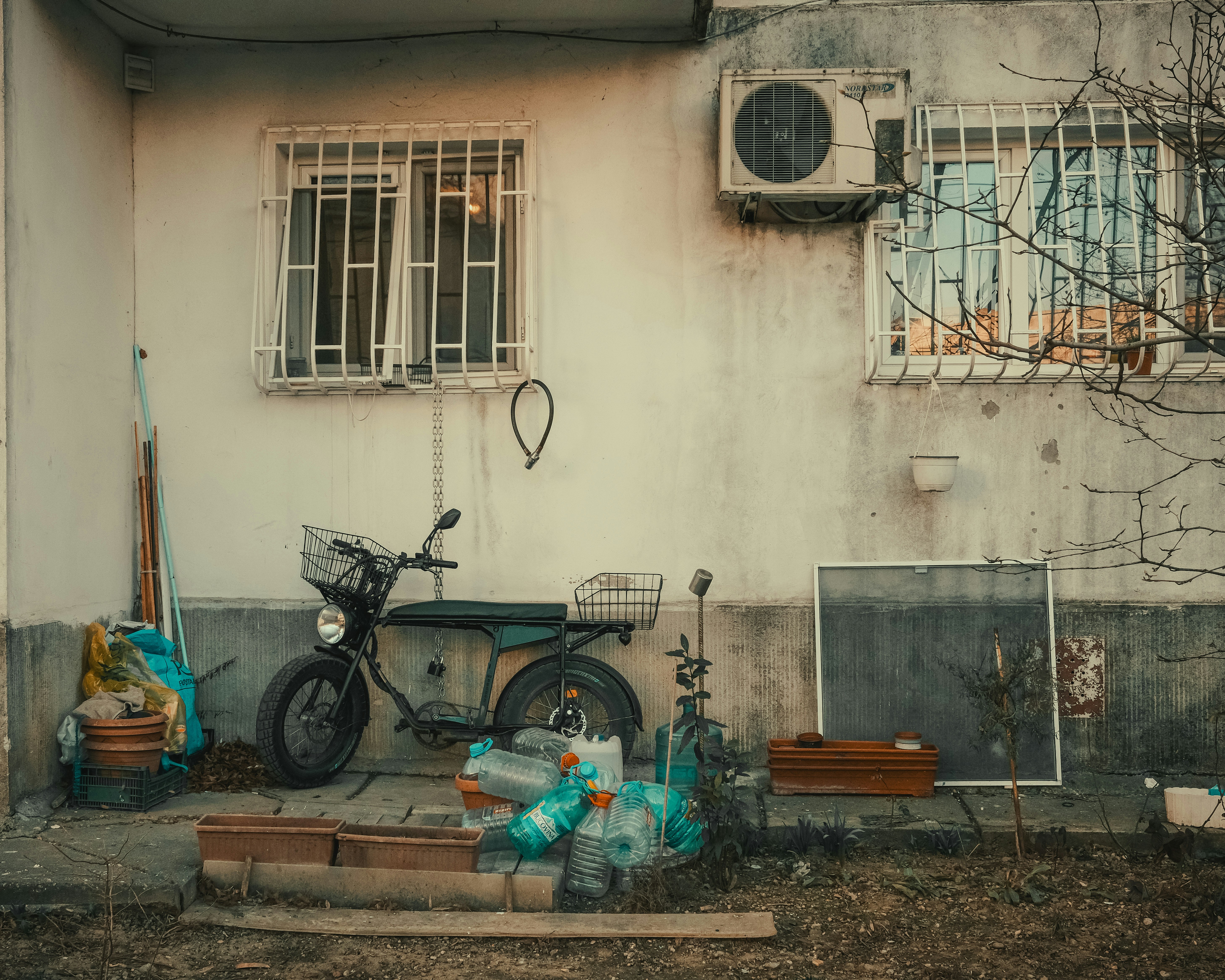 Urban Echoes: Cluttered Patina by the Wall