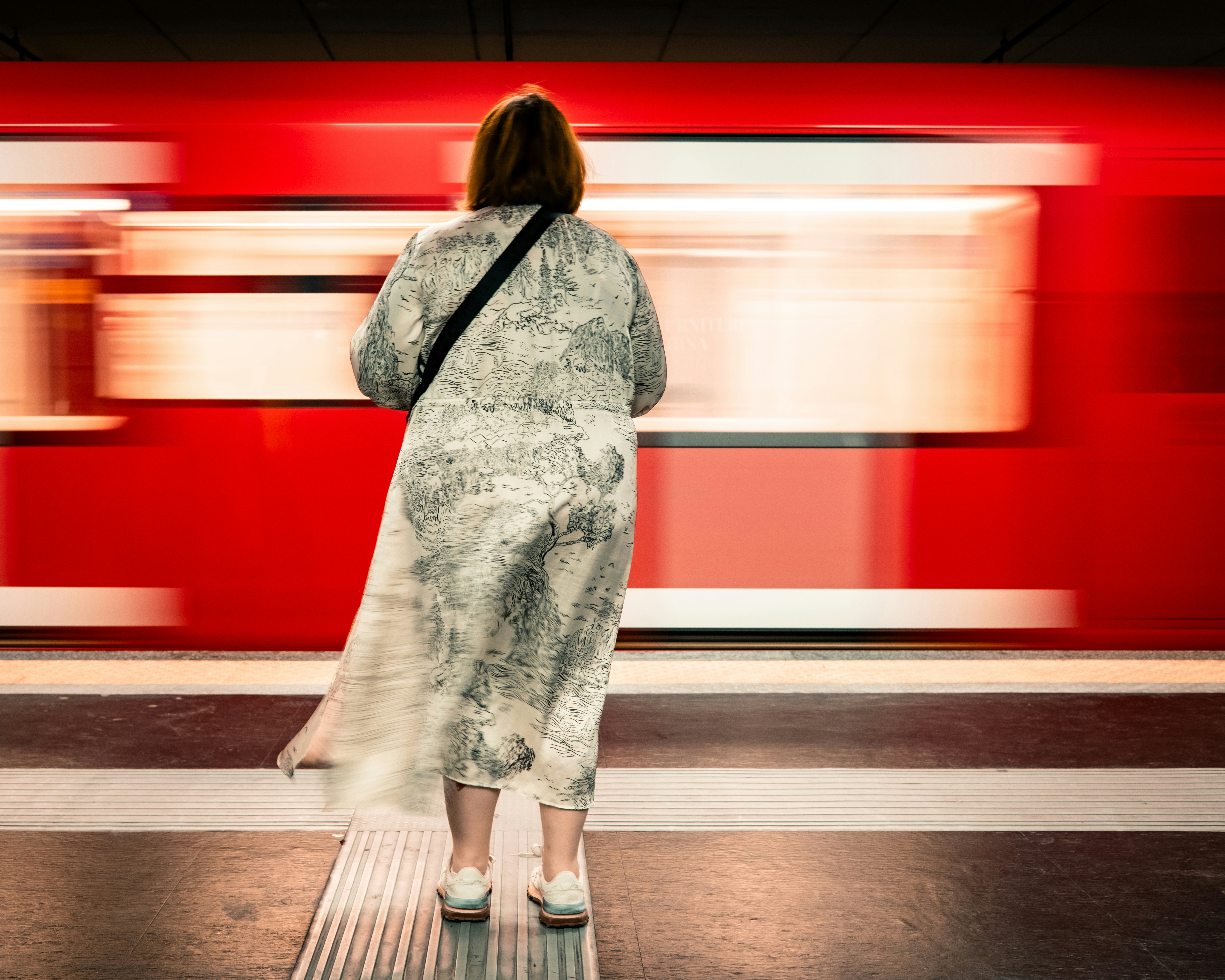 Red Train, Quiet Pause: A Traveler’s Back to the City Edge
