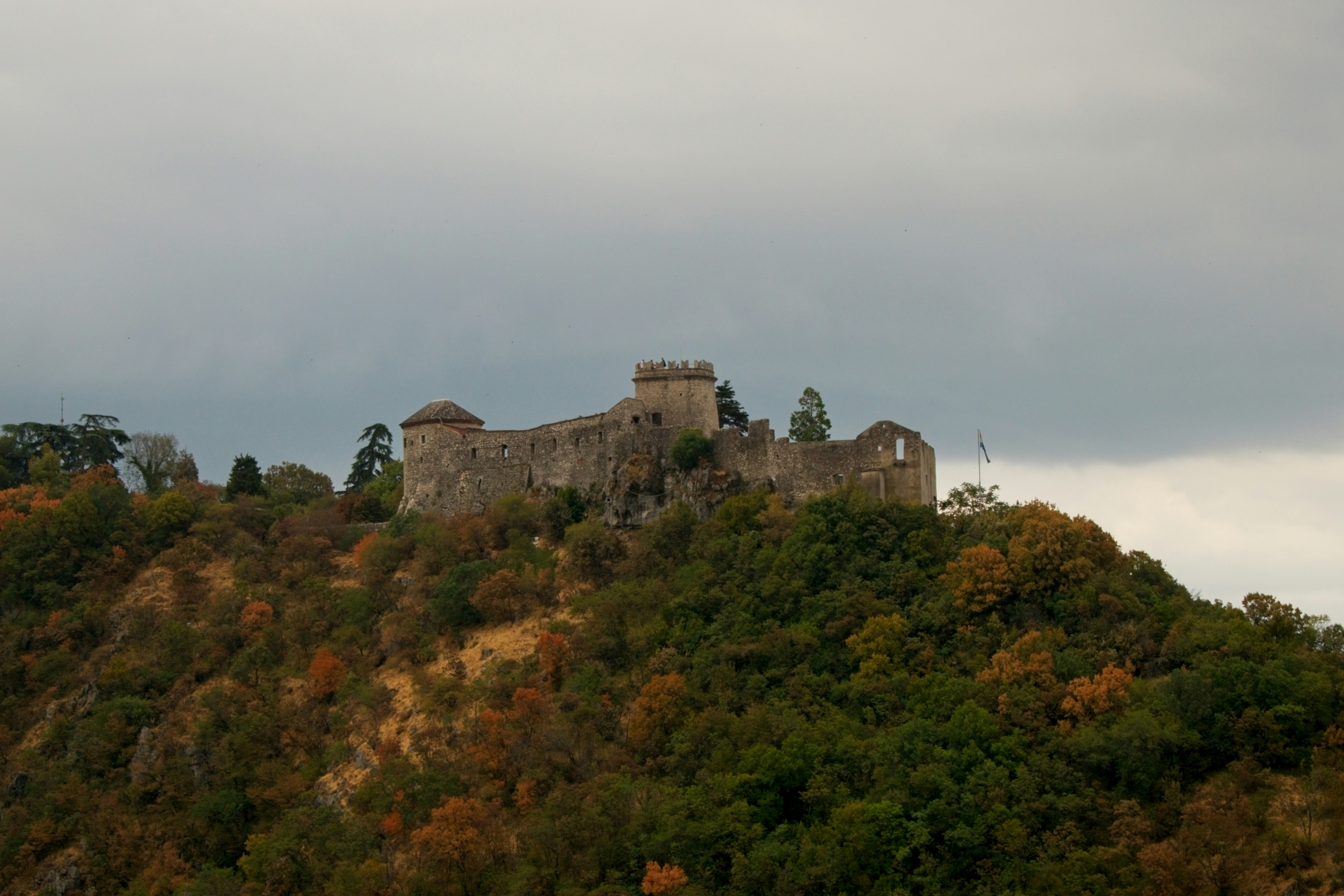 Ruined Hilltop Fortress Against Autumn Sky