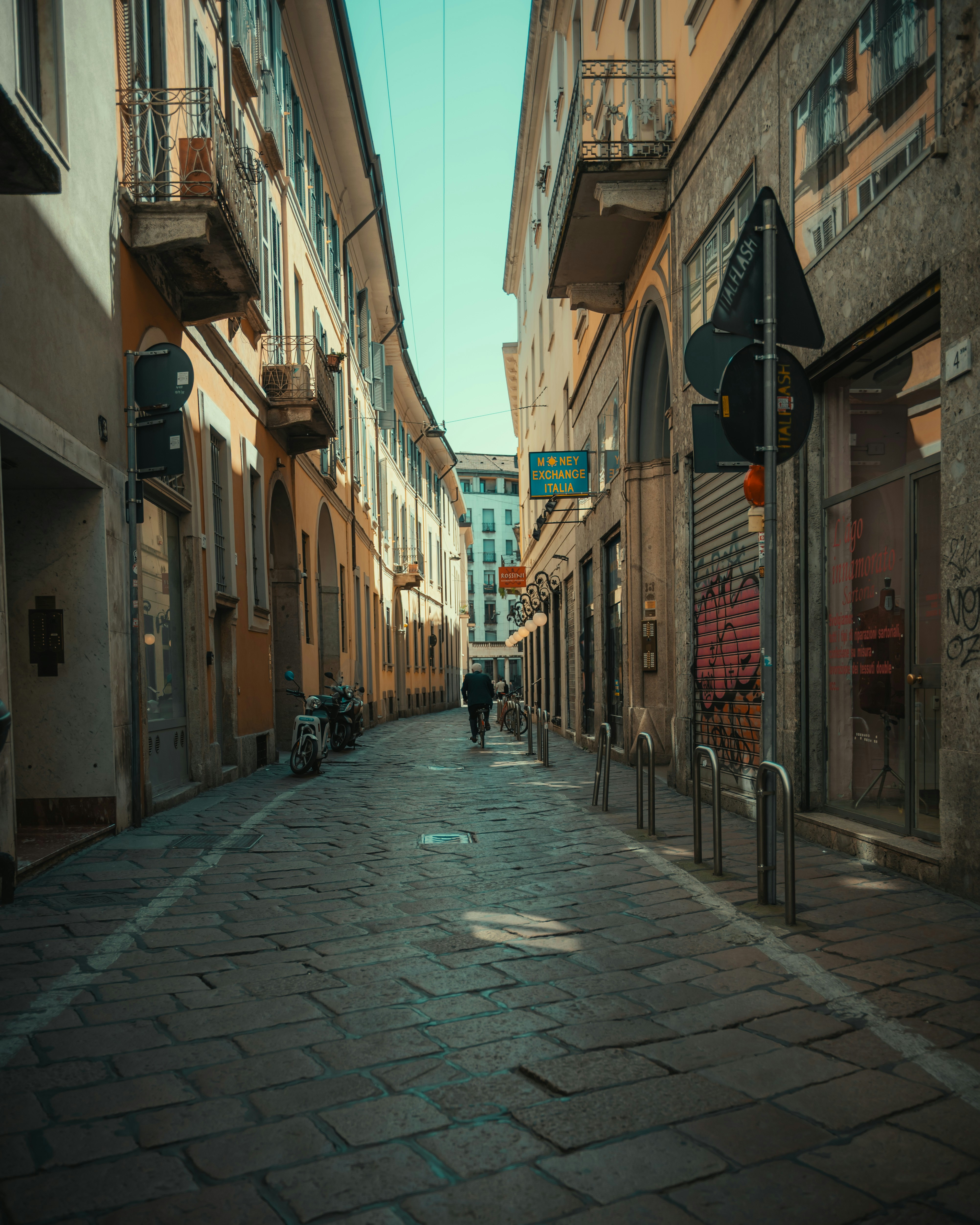 Cobbled Street Through Time: A Quiet Corridor Between Colorful Facades