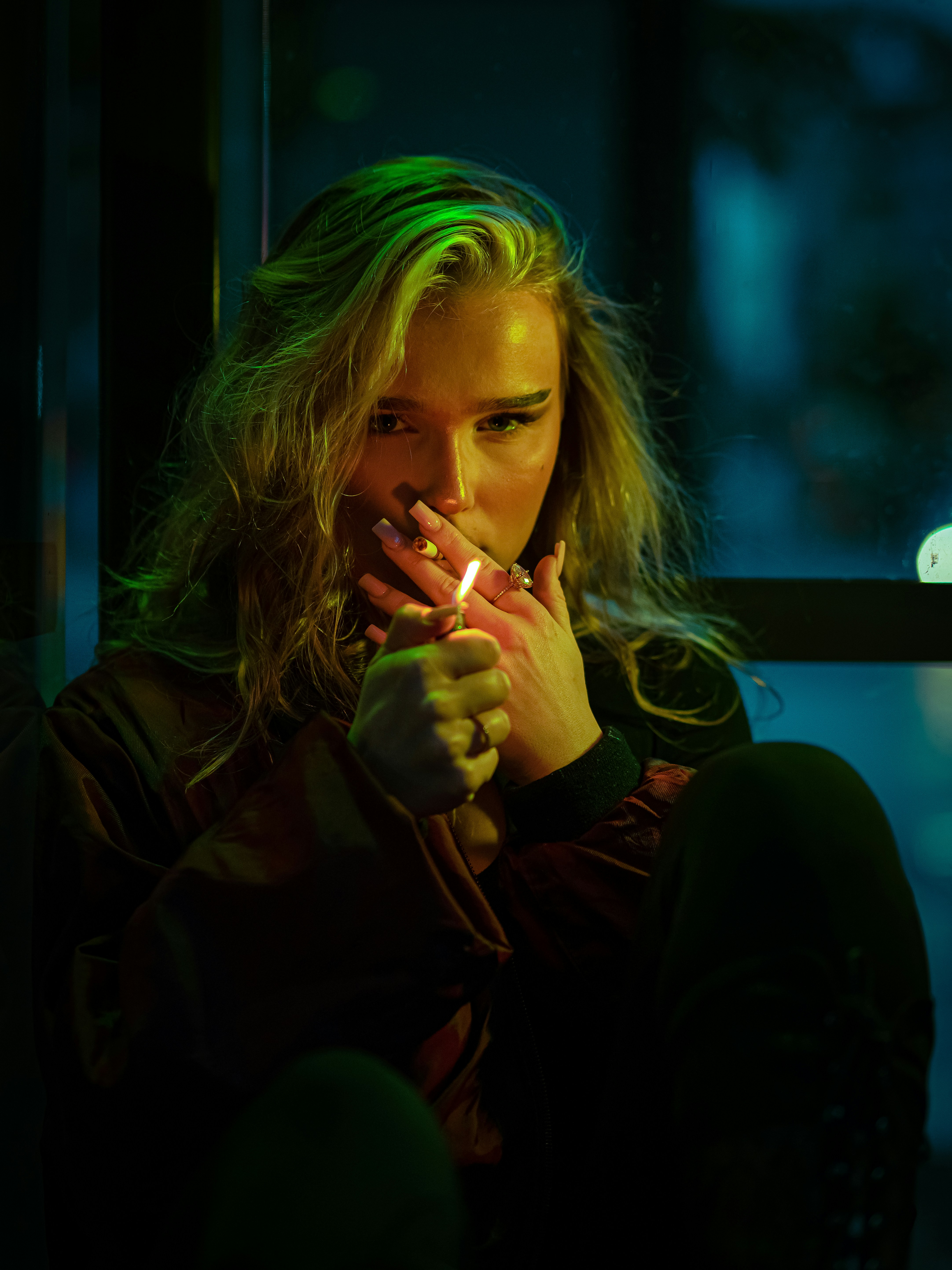 Neon-lit Confinement: A Quiet Moment with a Cigarette