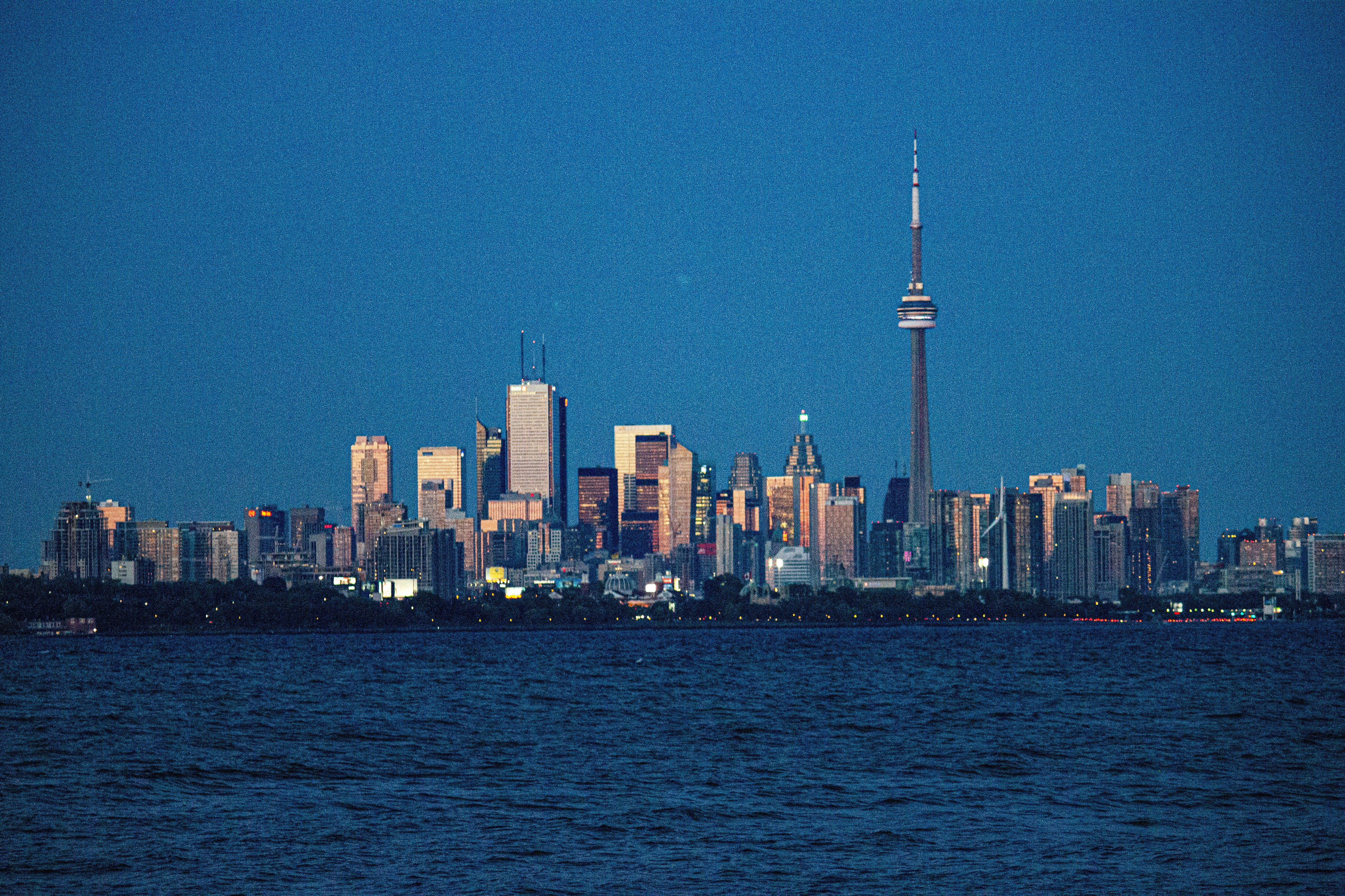 City of Towers dawned in blue across the water