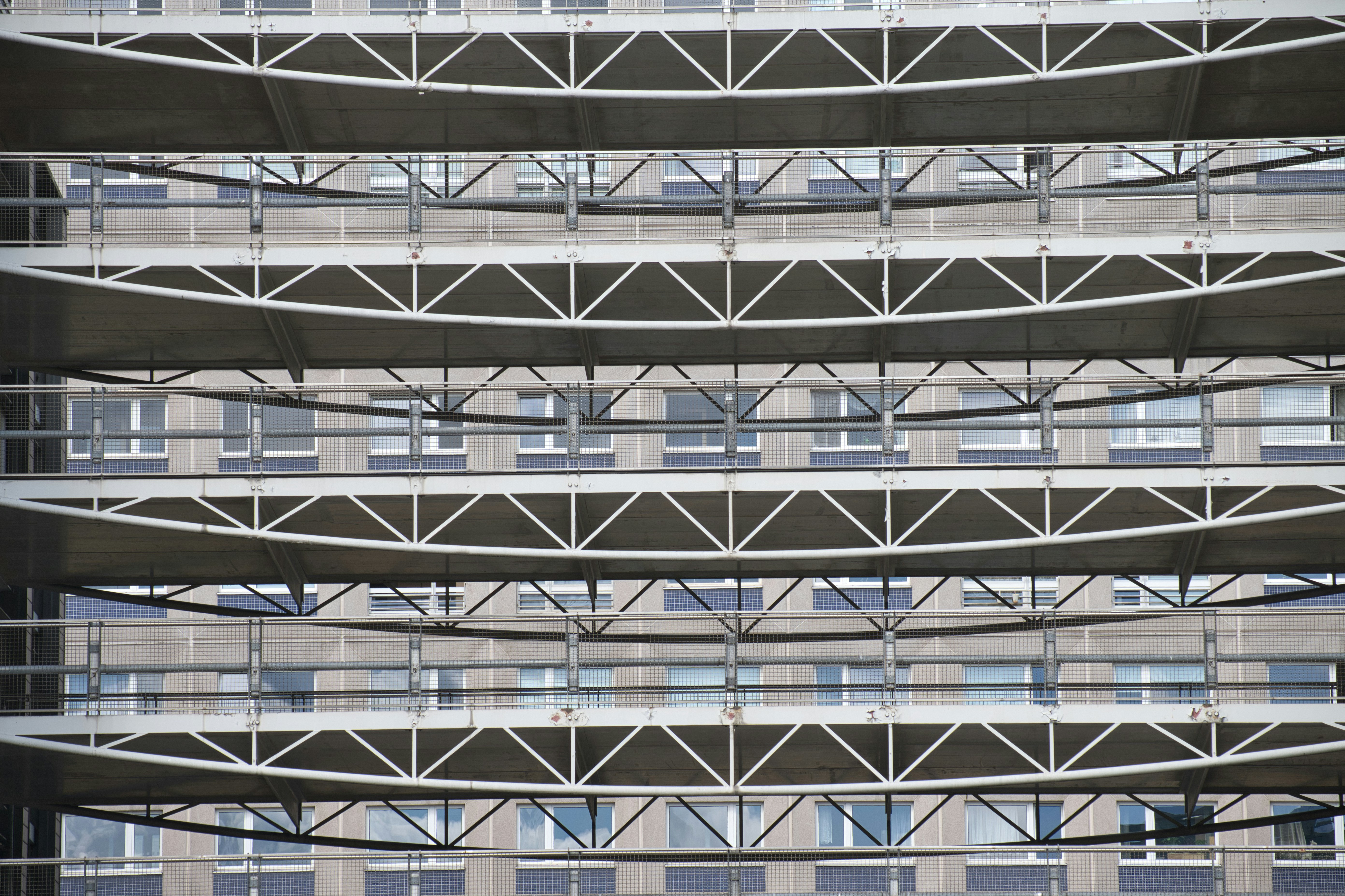 Crisscrossed Facades: Industrial Lattices Framing a Modern Skyline