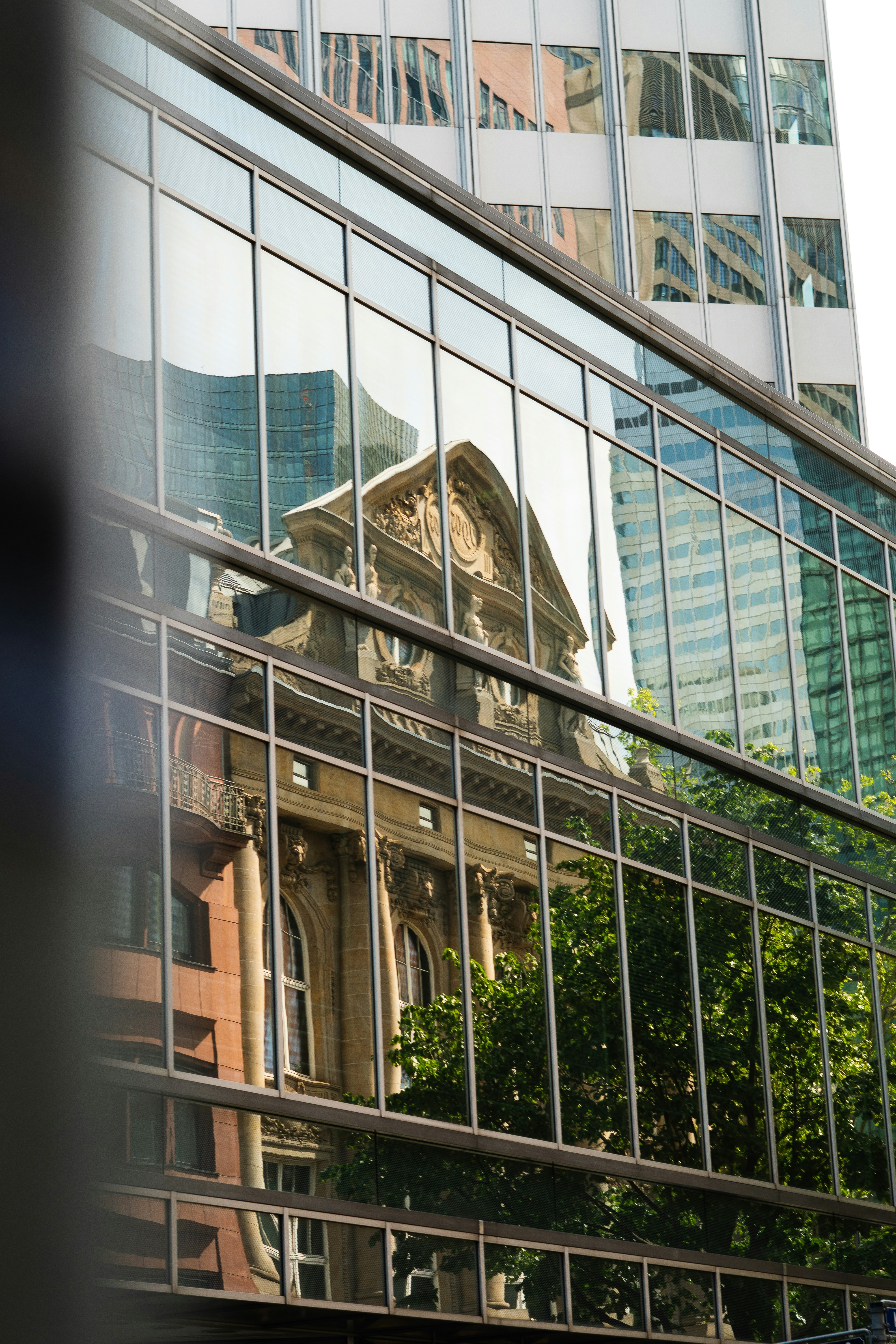 Reflections in Glass: Echoes of a Historic Facade in Modern Steel