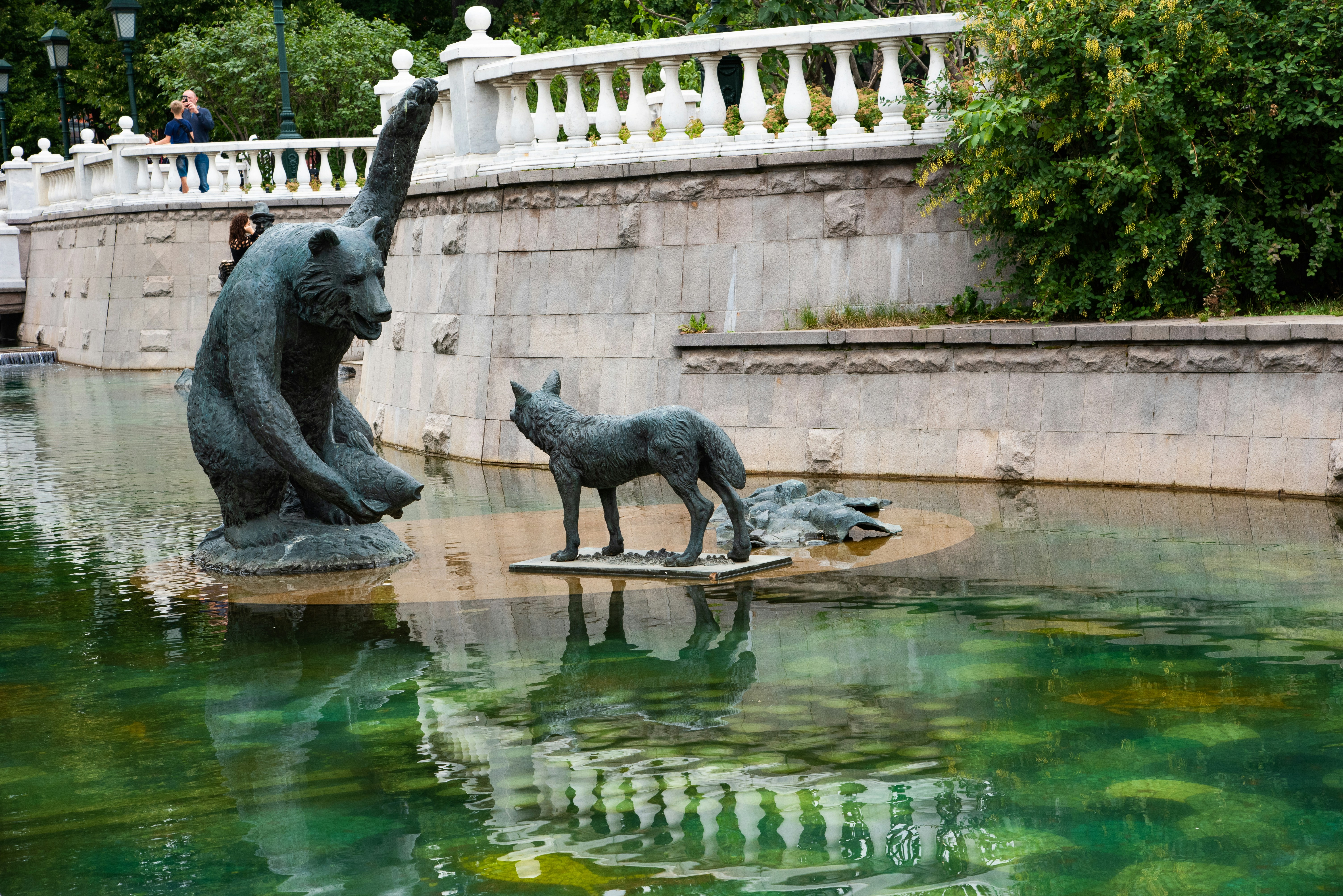 Reflections at the Pedestrian Bridge: A Pair of Sculptures over Calm Waters