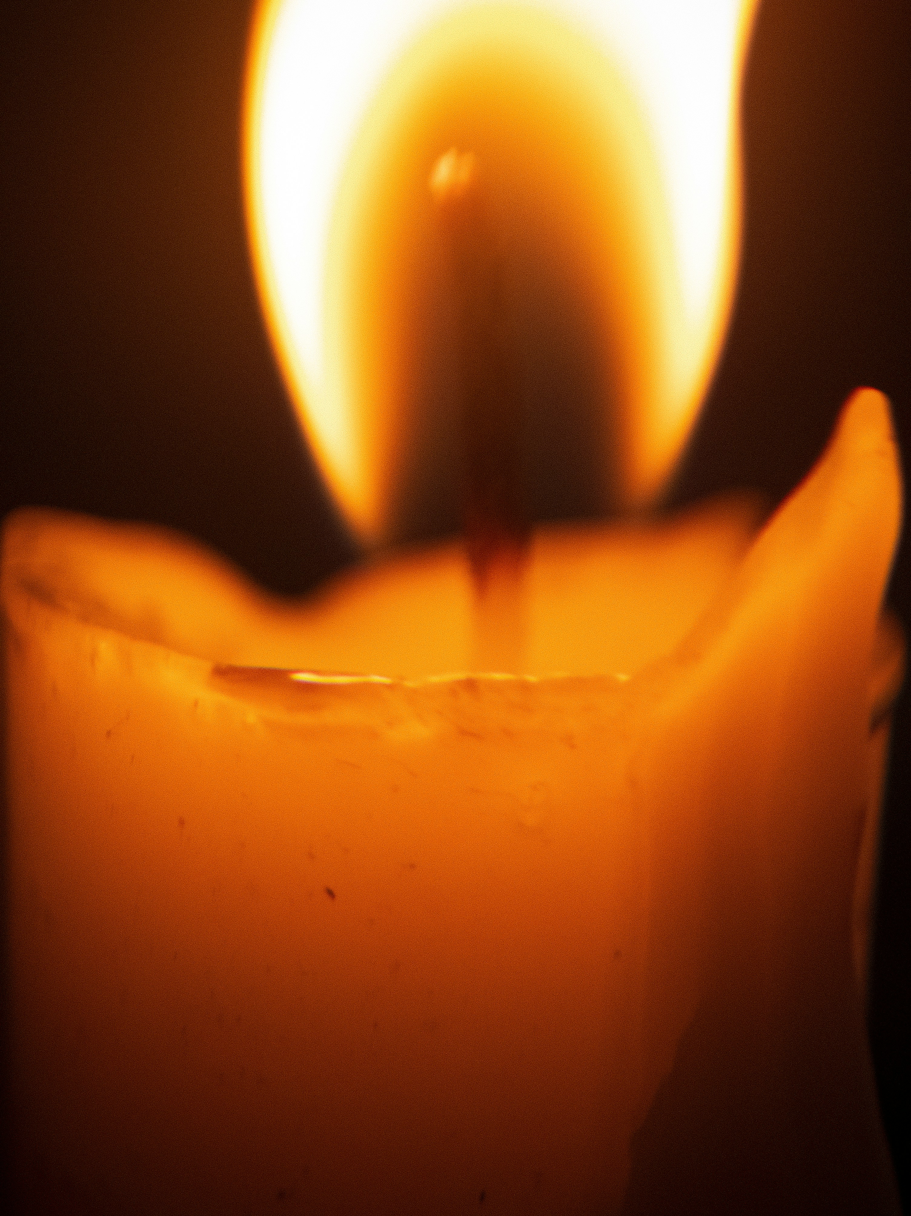 Close-Up Flame: A Candle’s Quiet Glow