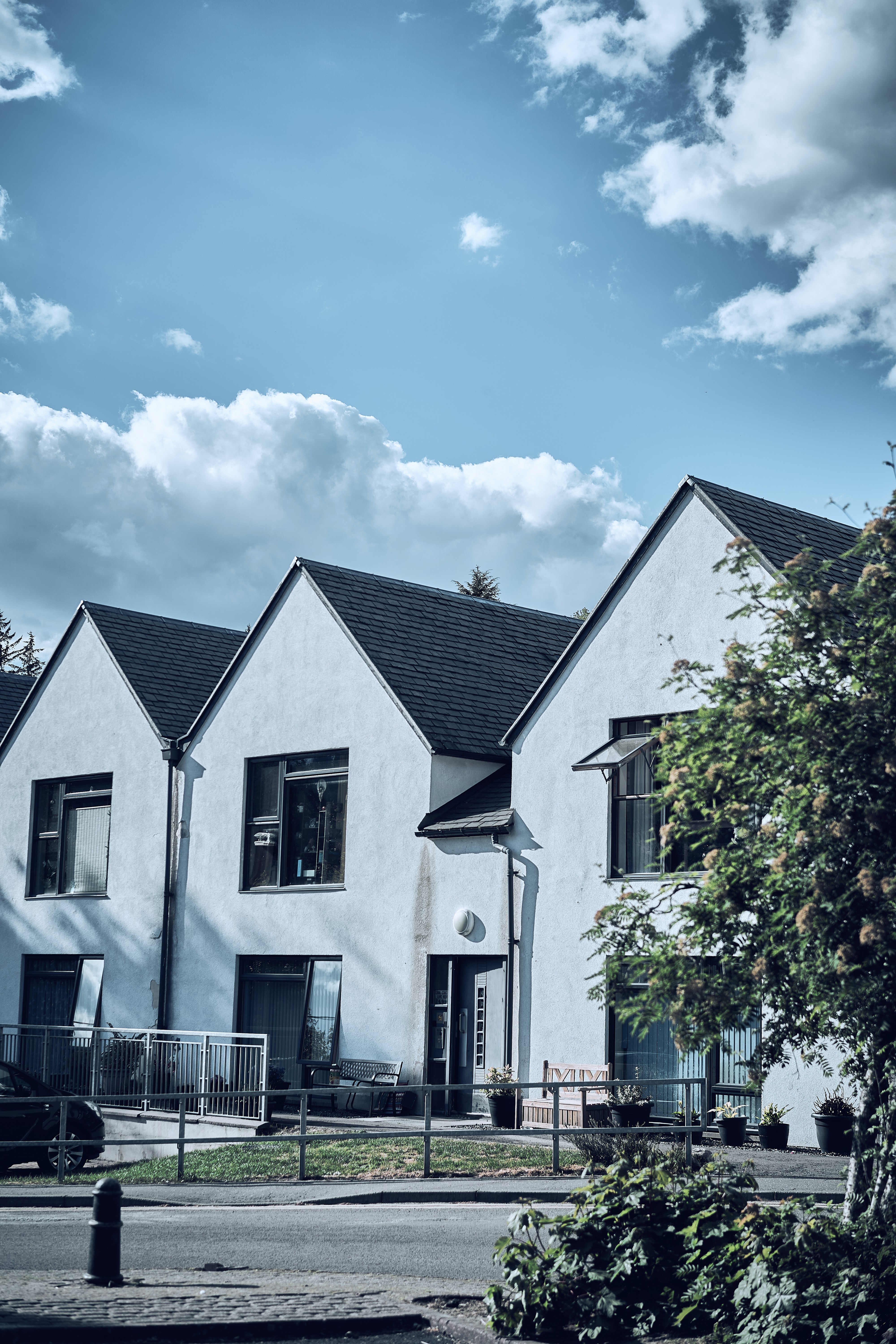 White-washed townhouses under a blue sky