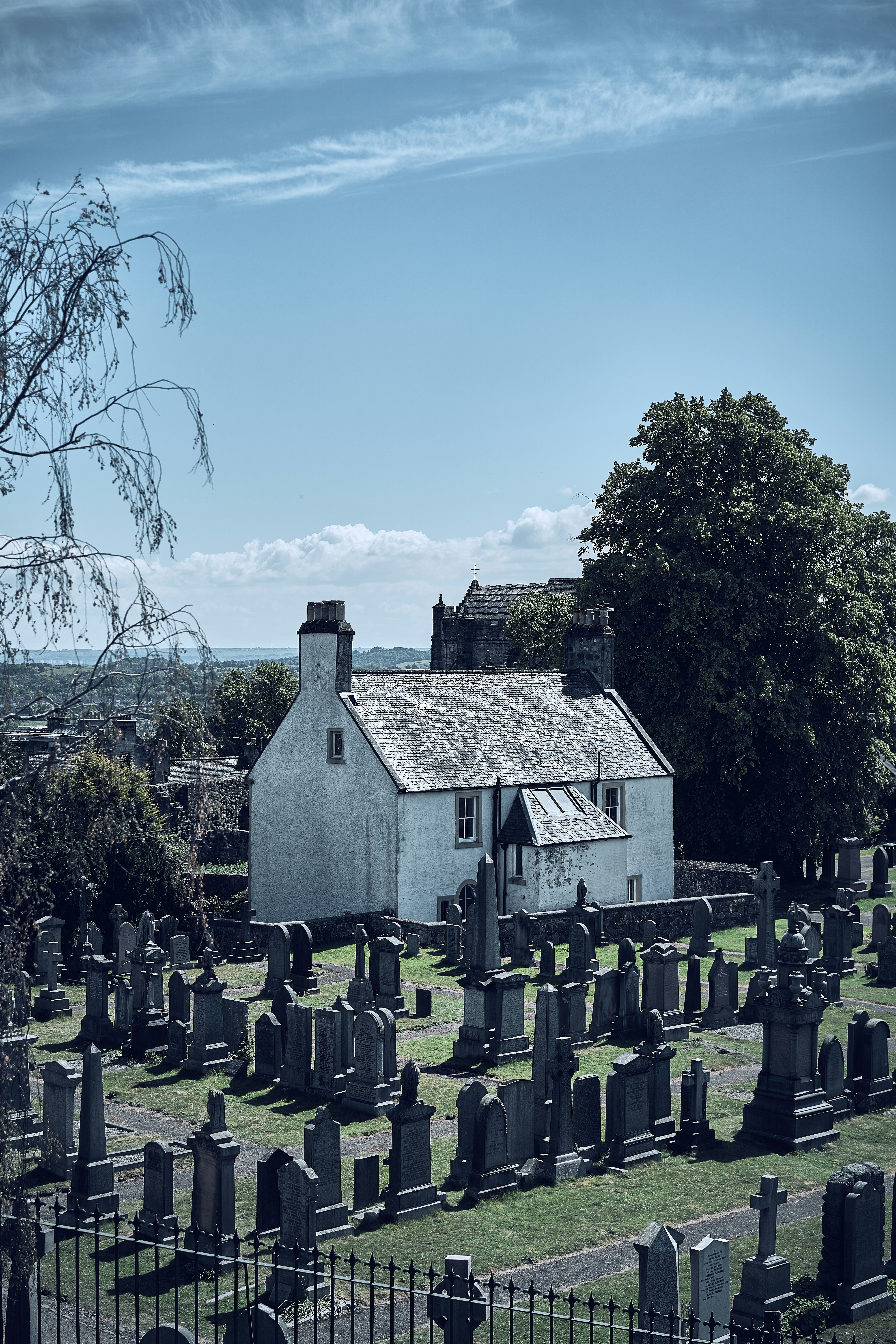 Quiet Abbey Yard under a Sable Sky