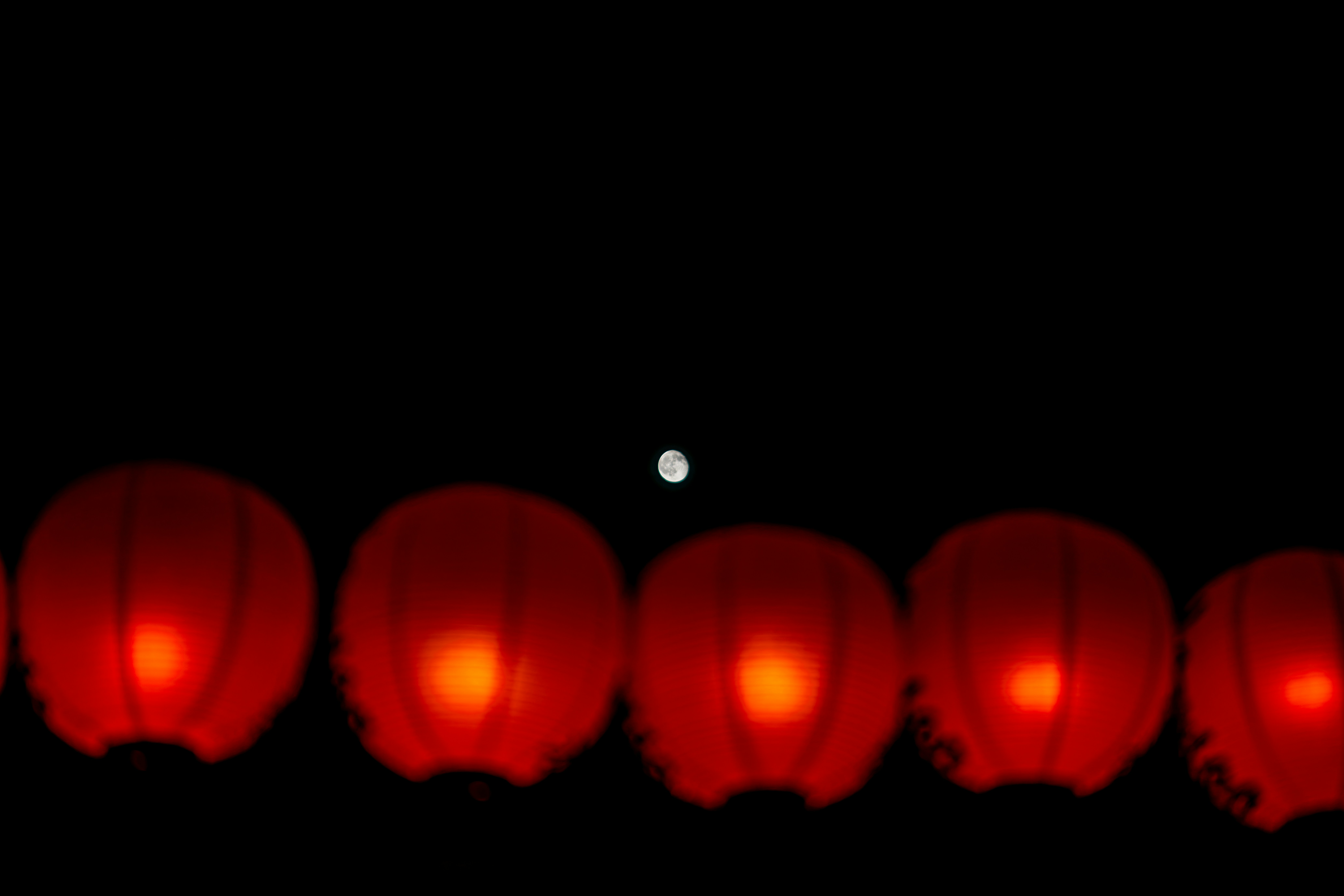 Row of Red Lanterns Awash in Nightfall