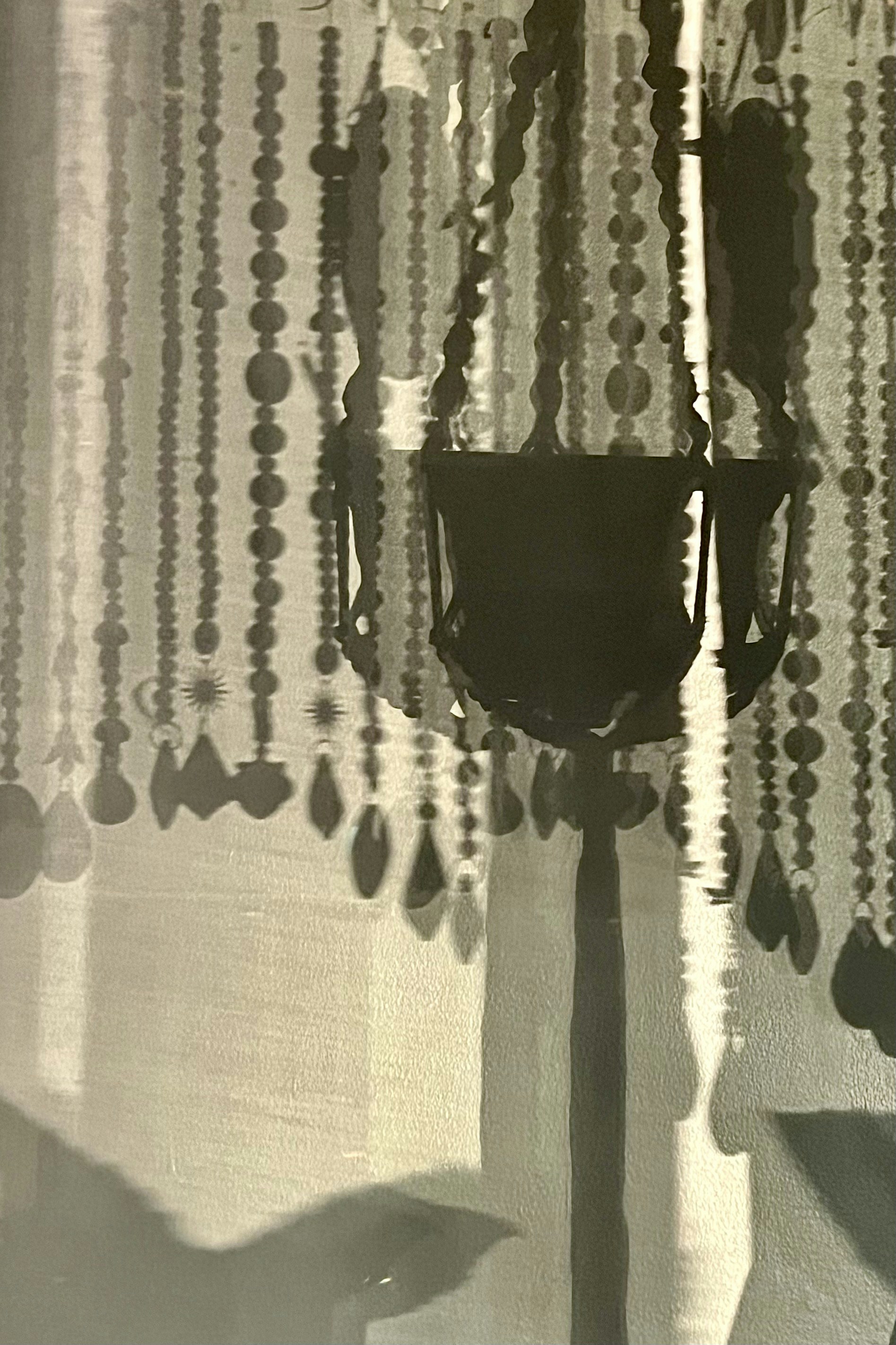 Beaded Curtain Shadow under a Streetlamp