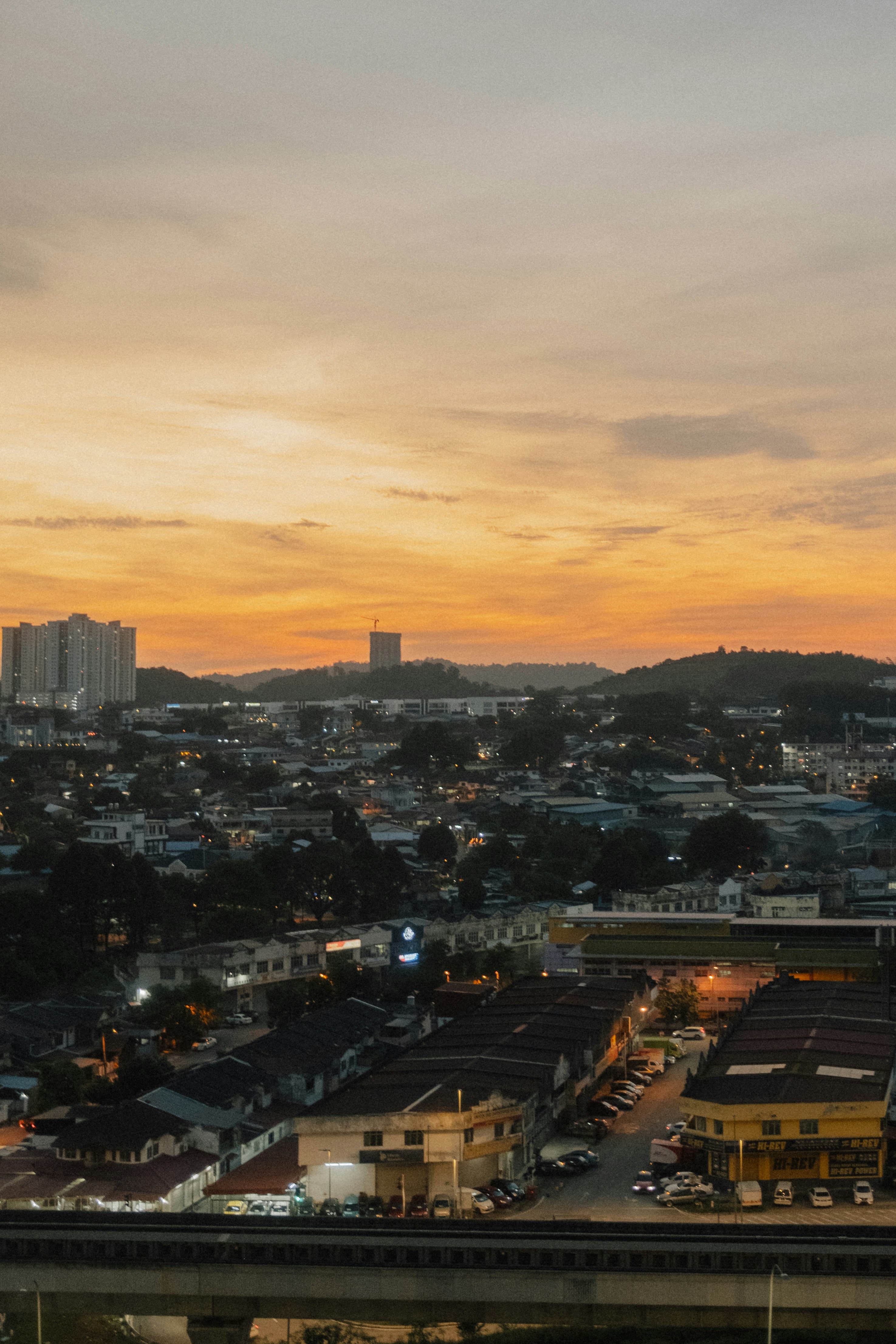 Sunset Over Suburban Spine: Dusk Illuminates a Quiet City Grid
