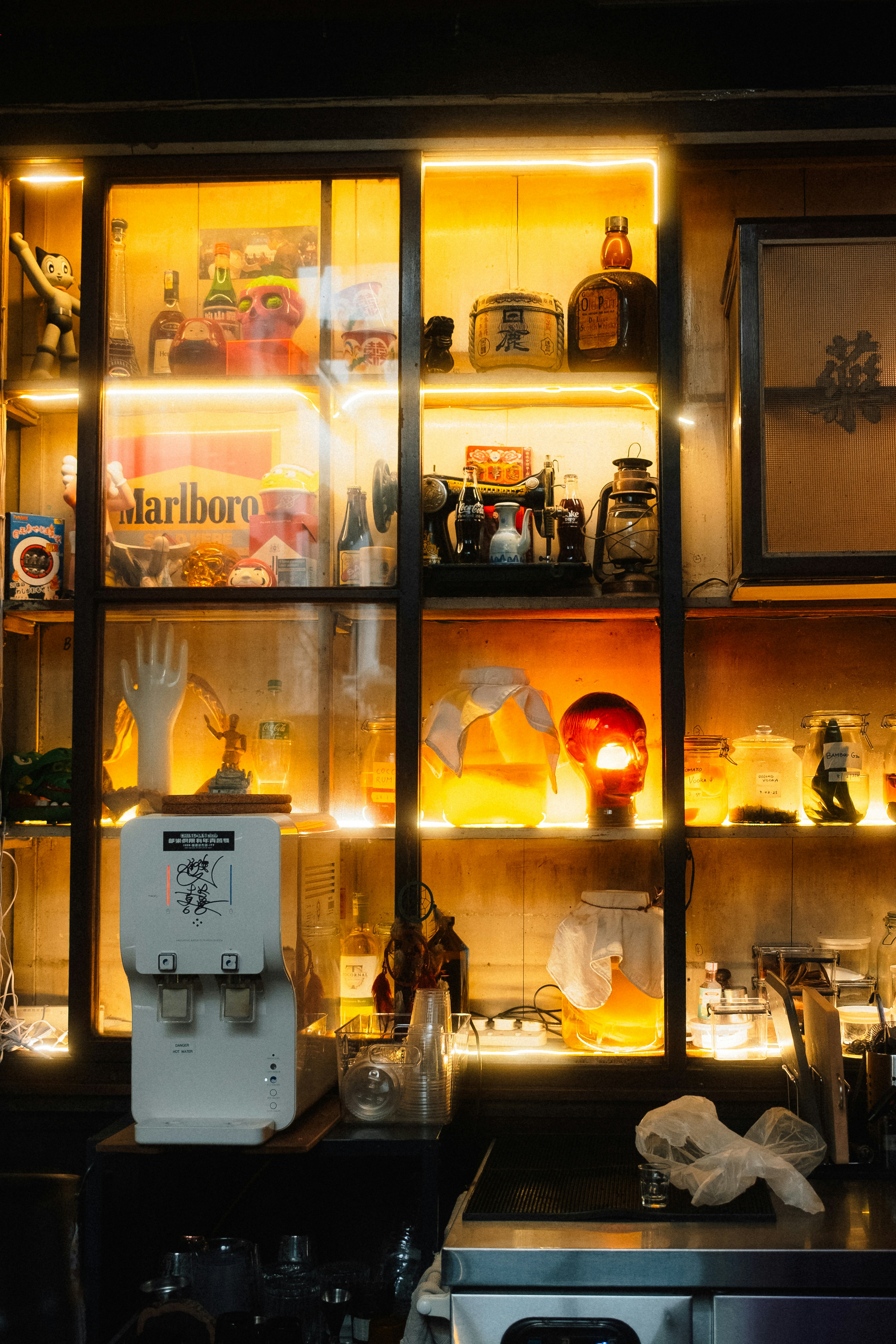 Warm Neon Cabinet: A Clockwork of Bottles and Bar-Tales