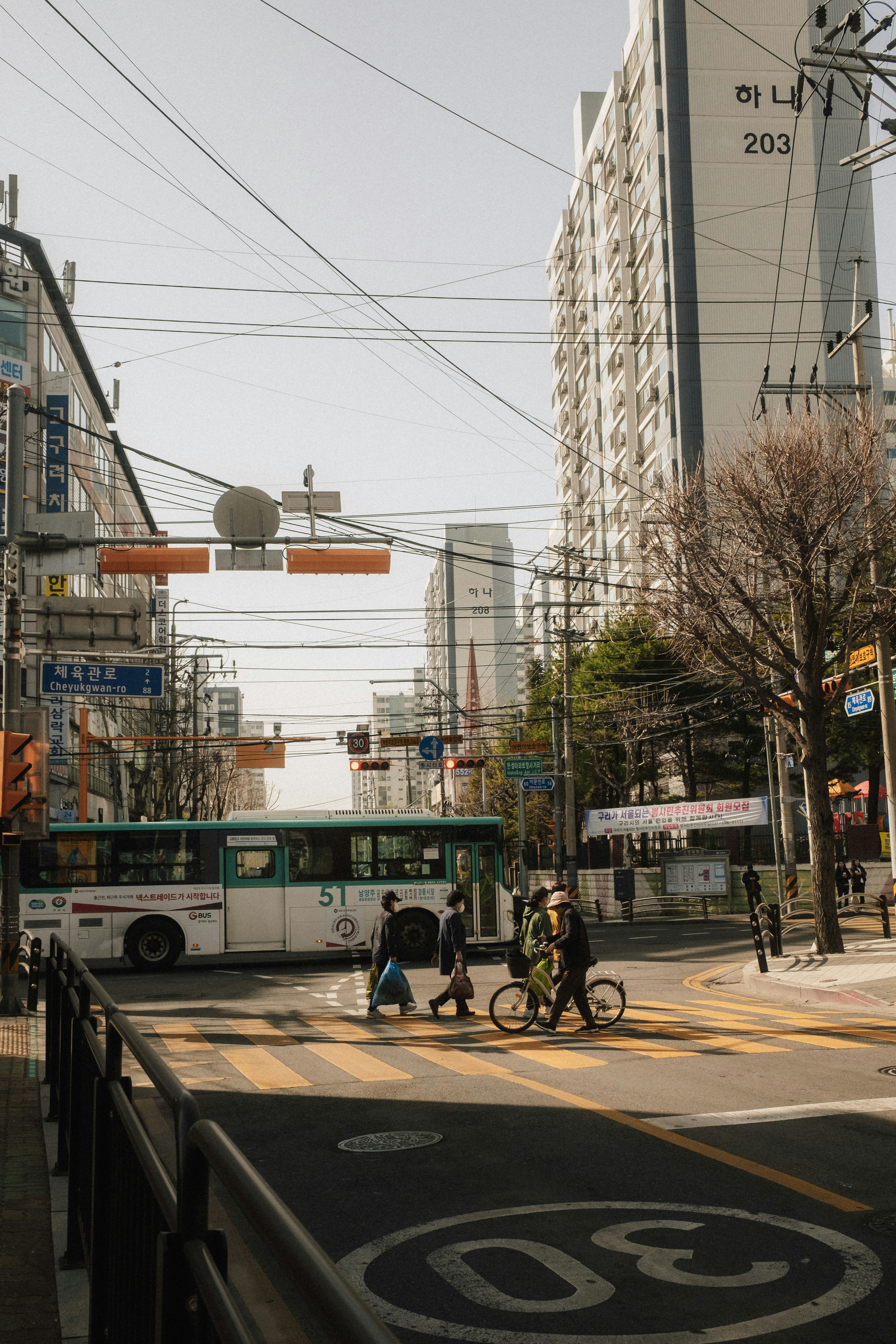 Crosswalk Confluence in a Busy Urban Corridor