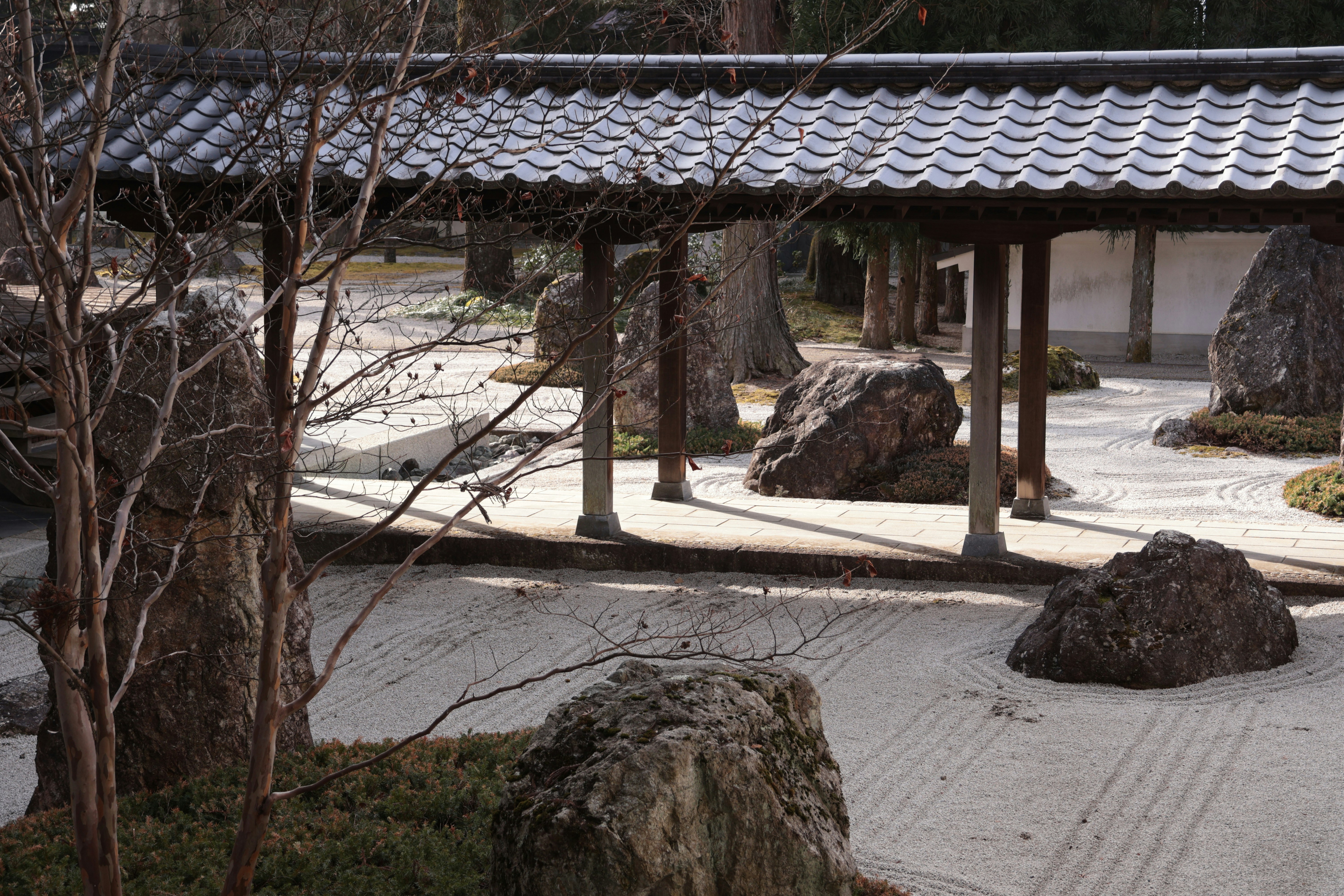 Quiet Zen Courtyard: Sand, Stones, and Wooden Walkways